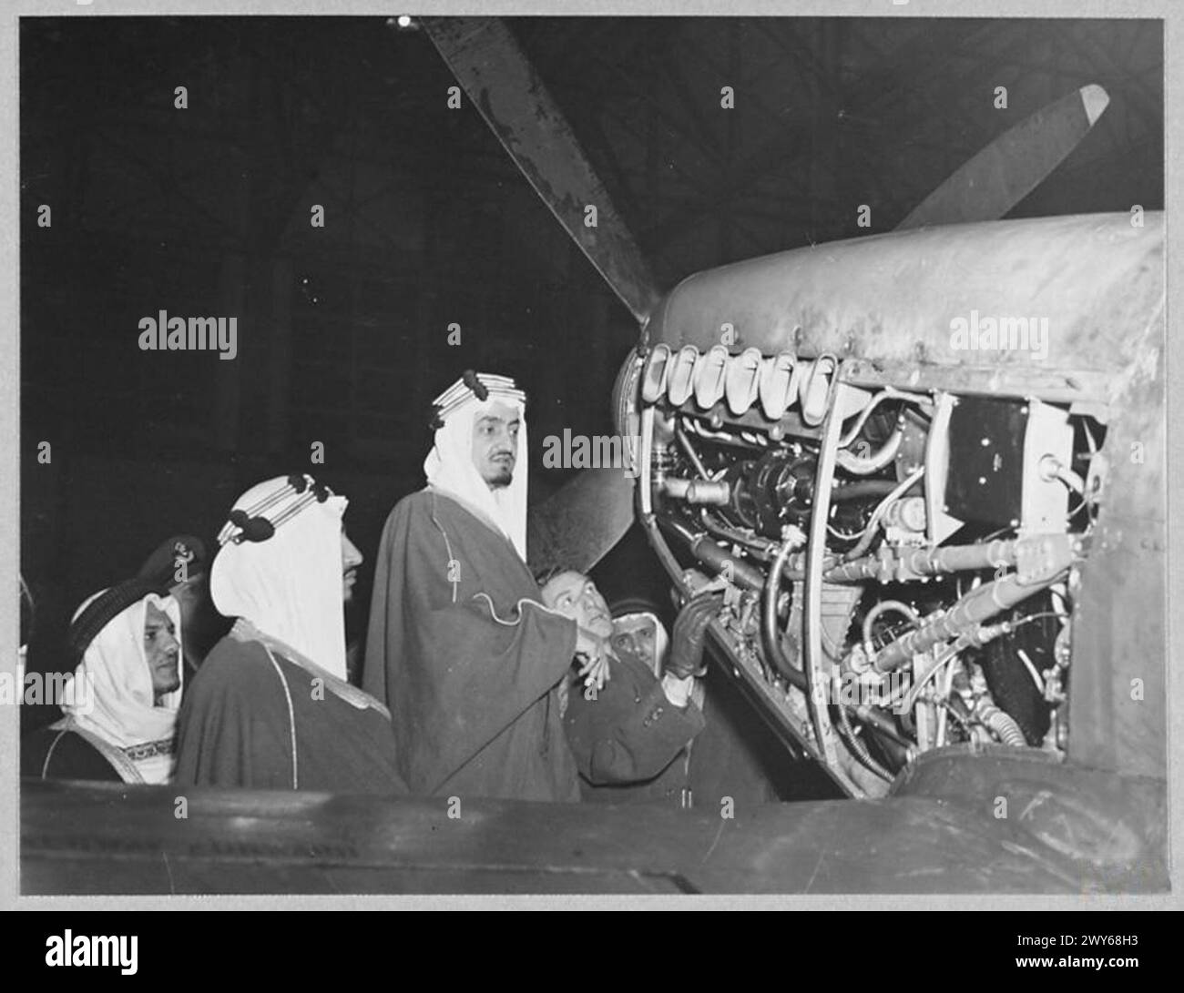 ARABIAN PRINCES VISIT RAF FIGHTER STATION - Emir Feisal (right), his ...
