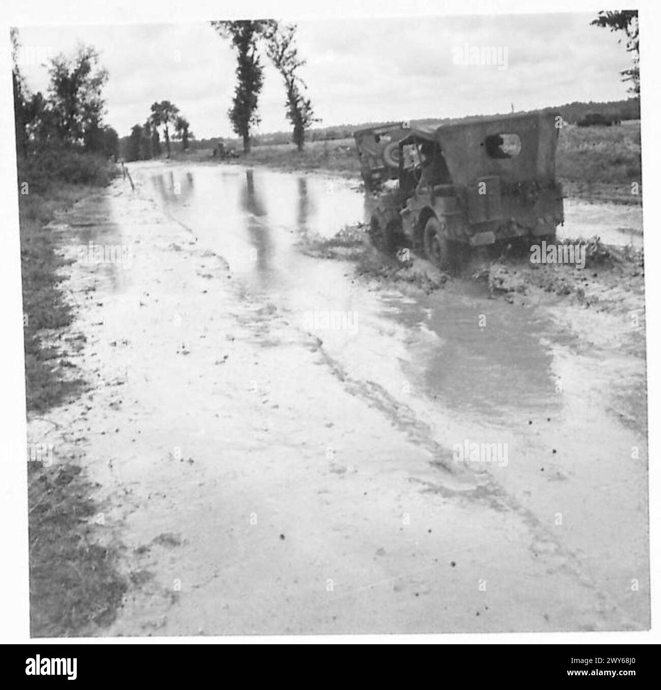 FLOODS IN NORMANDY - Vehicles making their way through the flooded ...