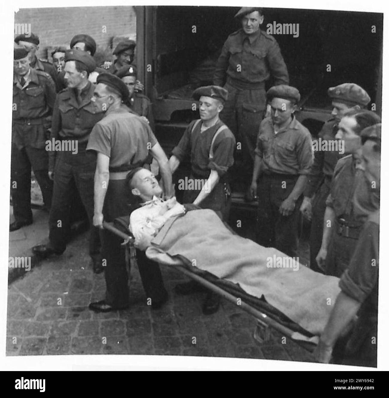 WILLIAM JOYCE AND WIFE AT 2ND ARMY - William Joyce being lifted from ...