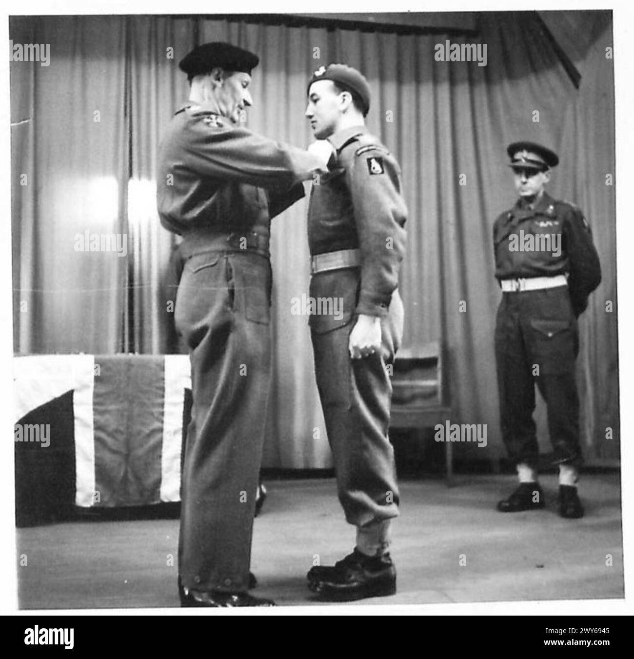 INVESTITURE BY FIELD MARSHAL MONTGOMERY - Captain Ashton 9 DLI receives ...