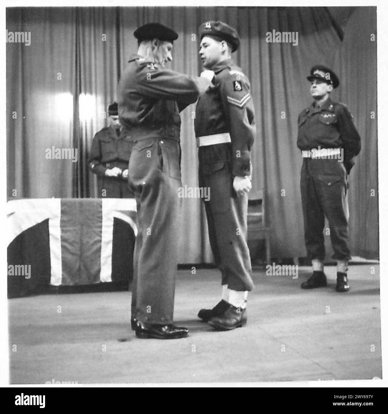 Cpl Bailey of 1/5 Queens receives the Military Medal from Field Marshal ...