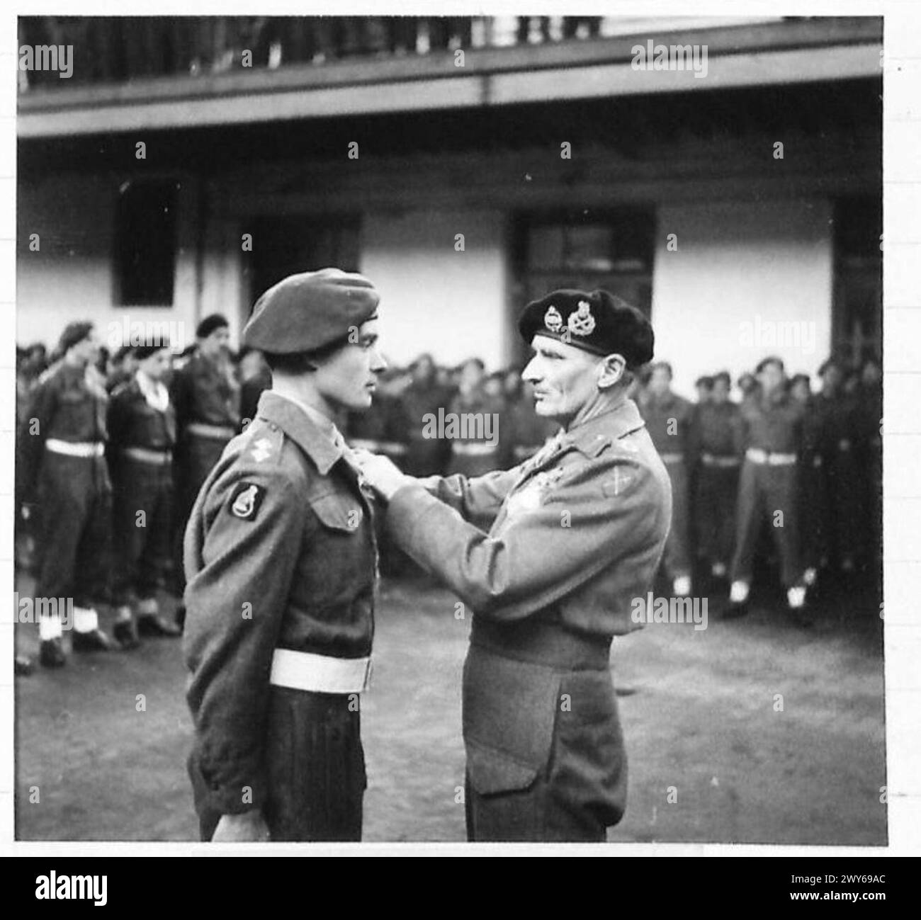 Lieutenant A. Ayling of the 65 Anti-Tank Regiment, Royal Artillery ...