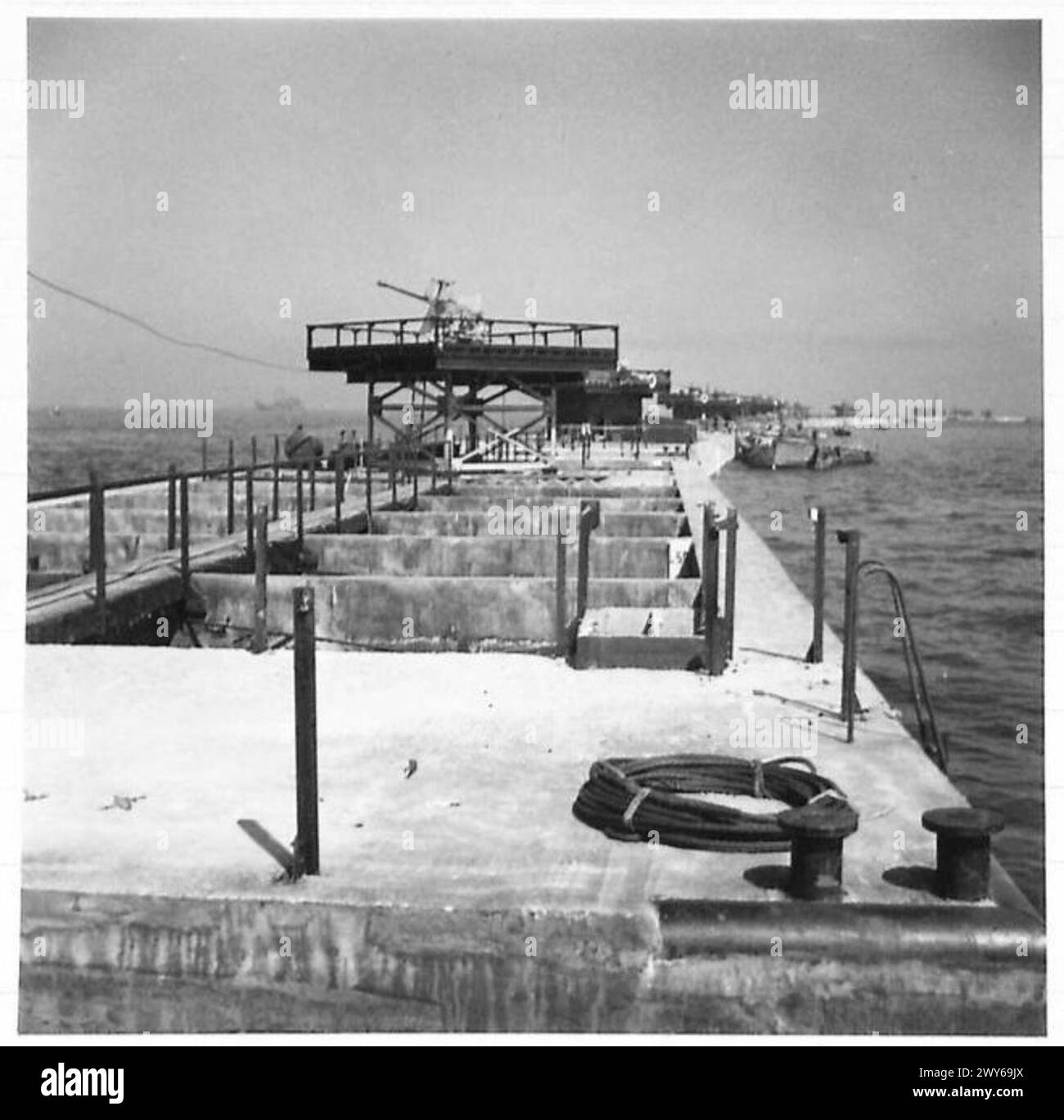 PHOTOGRAPHS OF PREFABRICATED PORT, ETC. - Concrete Units forming ...