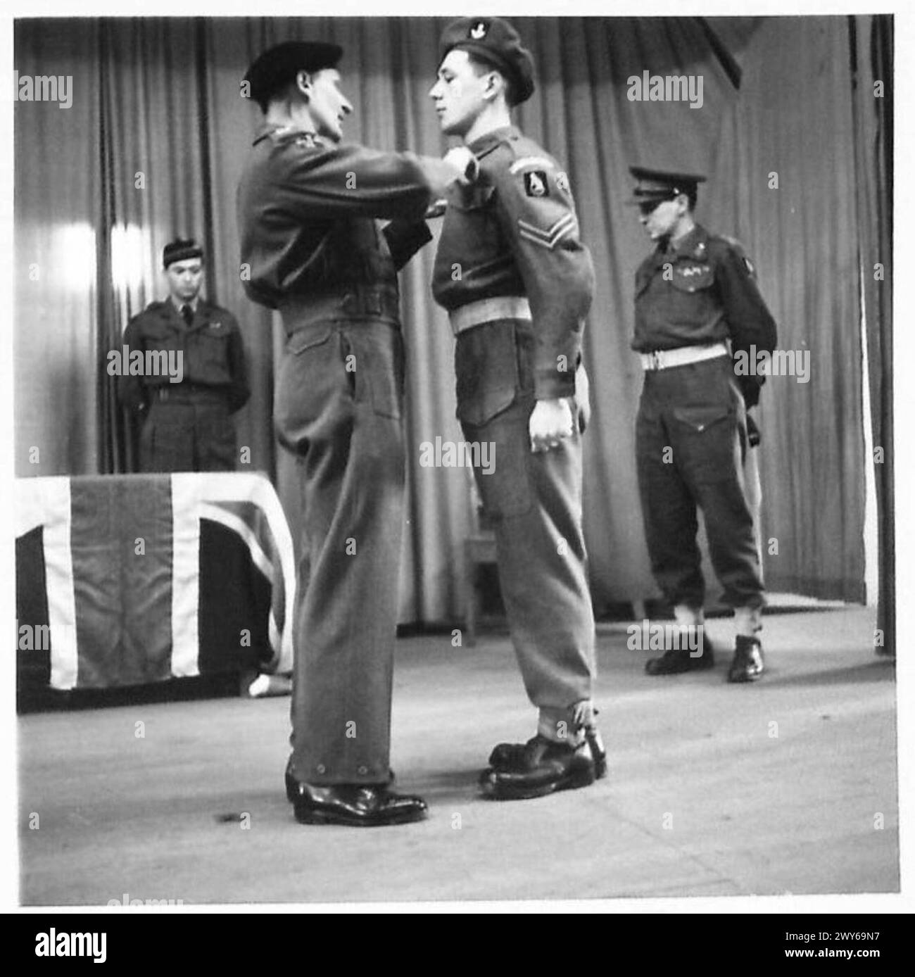 INVESTITURE BY FIELD MARSHAL MONTGOMERY - Cpl Oliver 9 DLI receives the ...