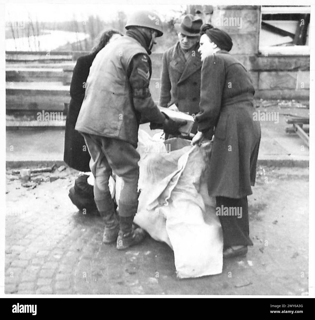 MILITARY GOVERNMENT IN RHEINE - A Military Government officer, with the ...