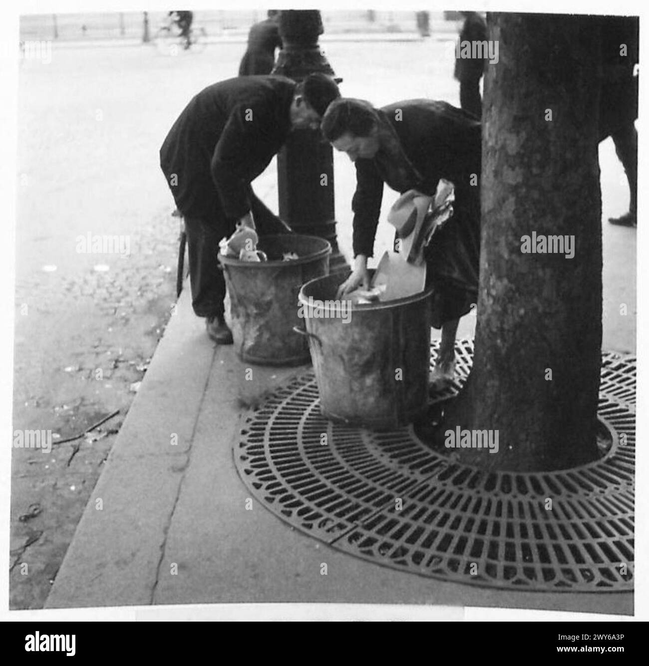 Two dustbins Black and White Stock Photos & Images - Alamy