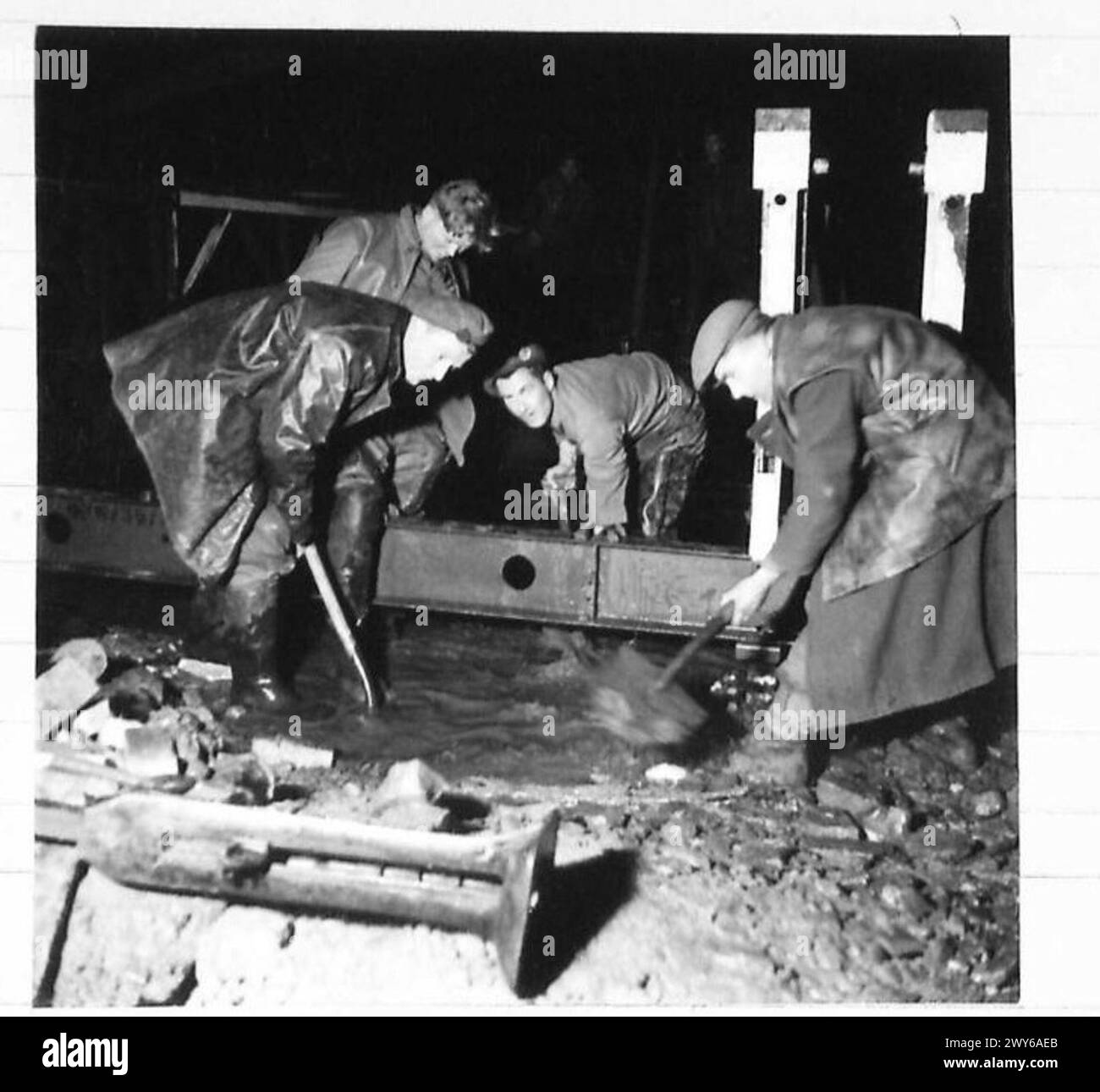 SAPPERS WORKING AT NIGHT ON BAILY BRIDGE - Sappers working to make a ...