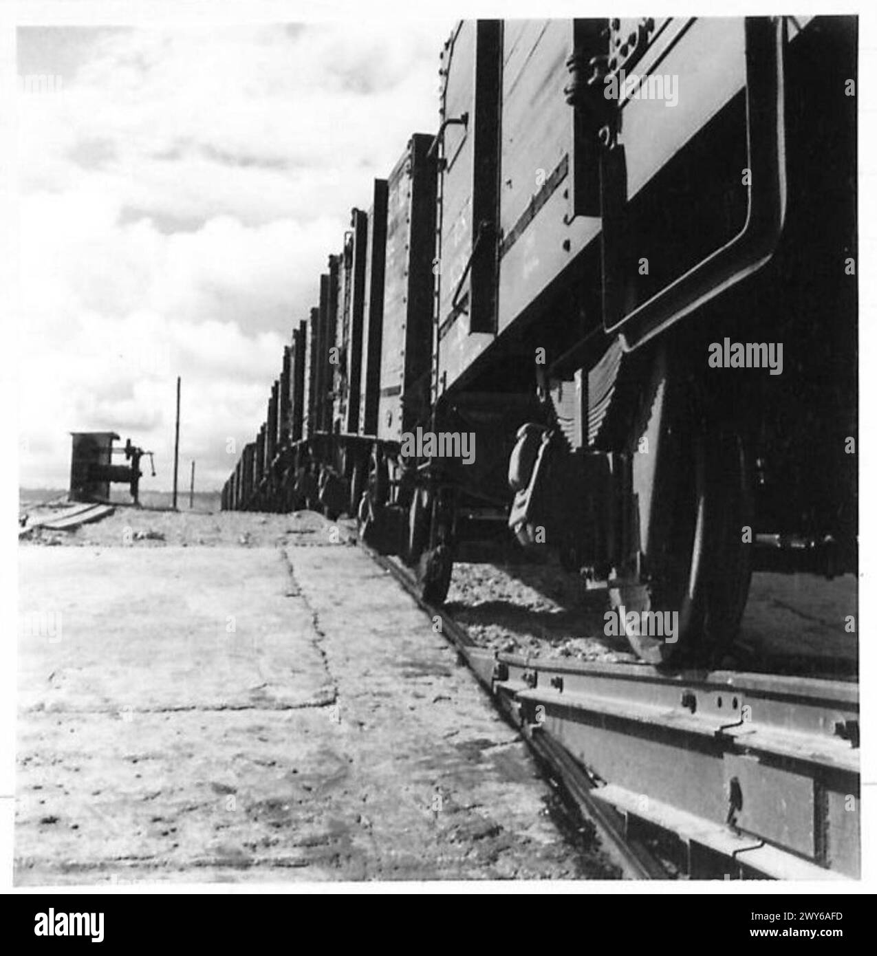 PHOTOGRAPHS OF PREFABRICATED PORT, ETC. - Train wagons leaving Landing ...