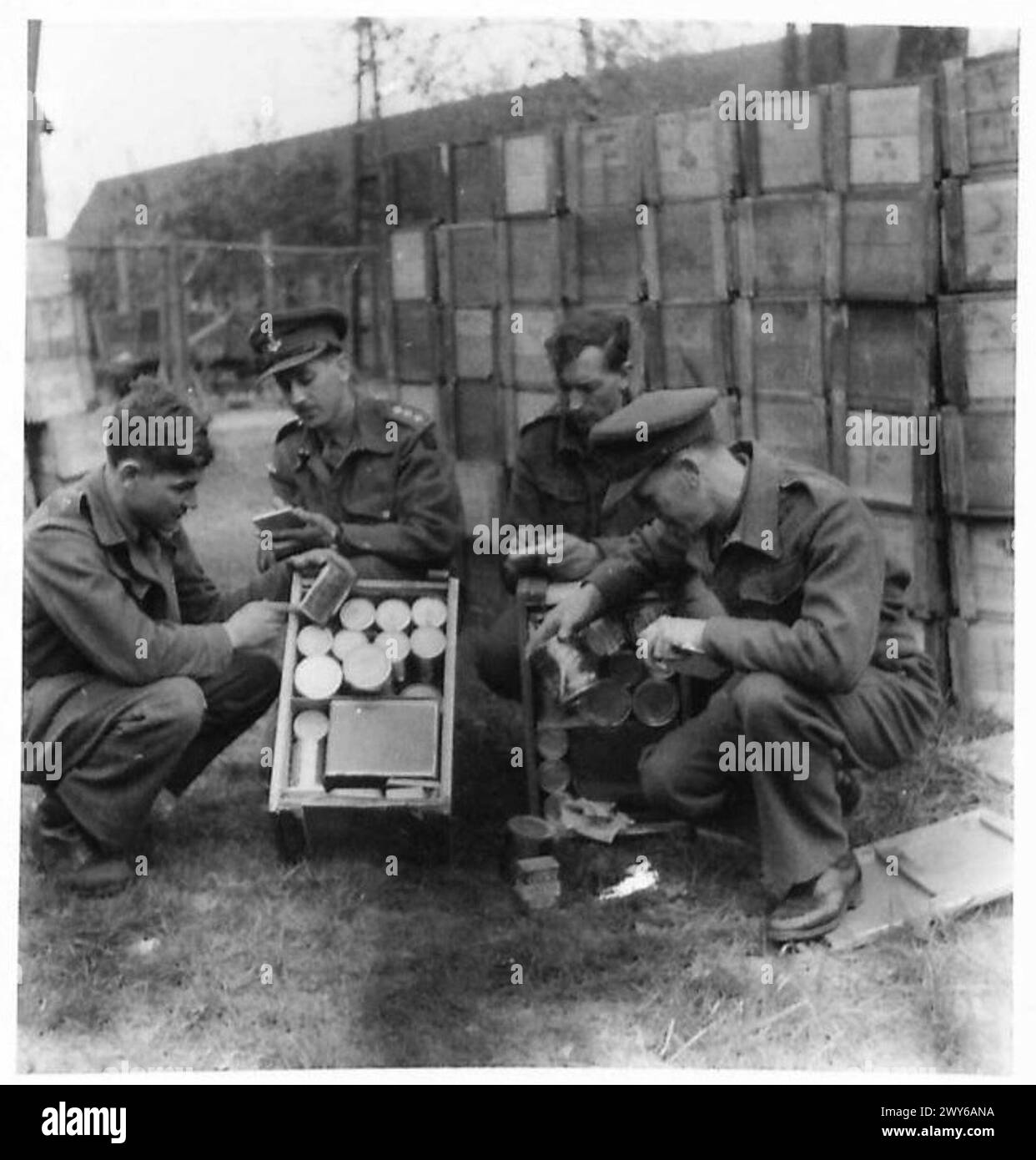 P.O.W. LIFE IN GERMANY - Messing officers checking in 'Compo' rations ...