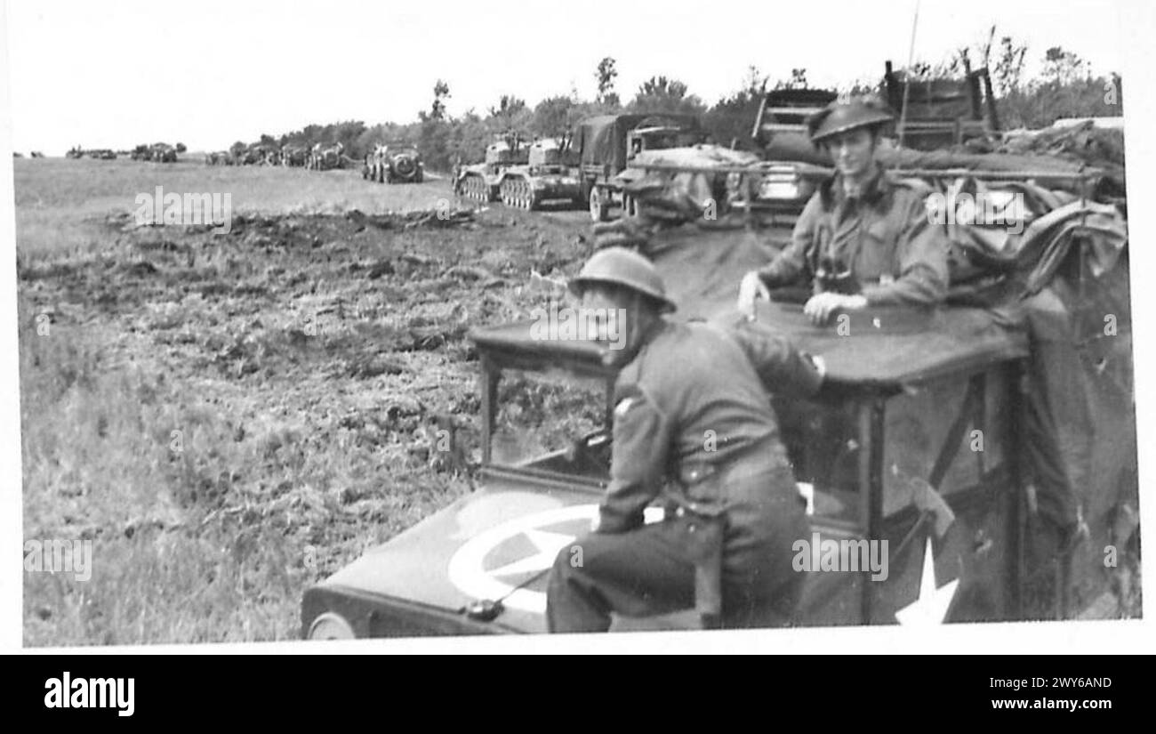THE BATTLE OF FRANCE - Tanks and vehicles waiting behind the brow of a ...