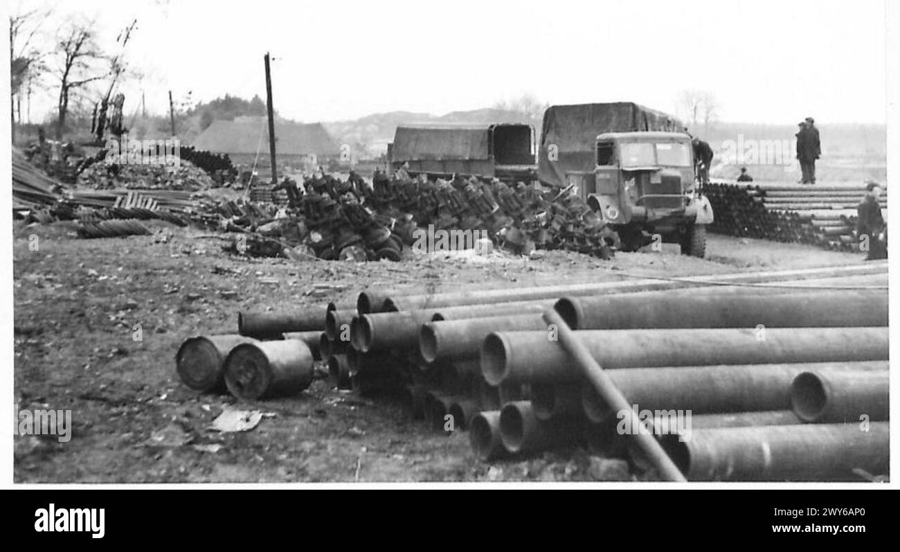 THE LIFE-LINE OF THE ARMY - Pipes being loaded on to a truck. , British ...