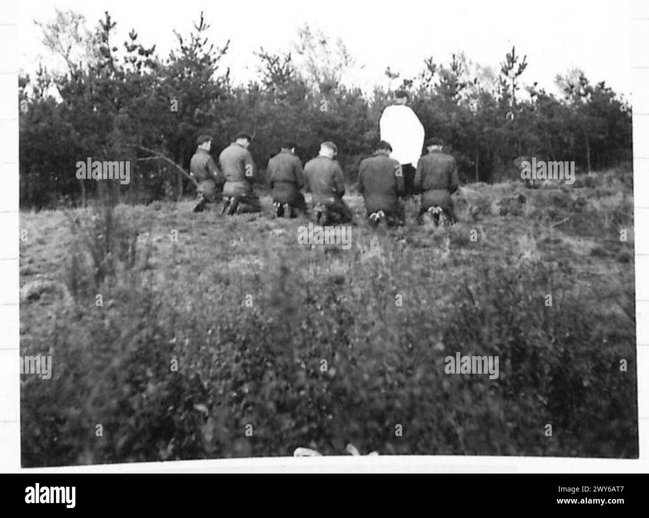 Men of the 53rd Division Reconnaissance receive Holy Communion before ...