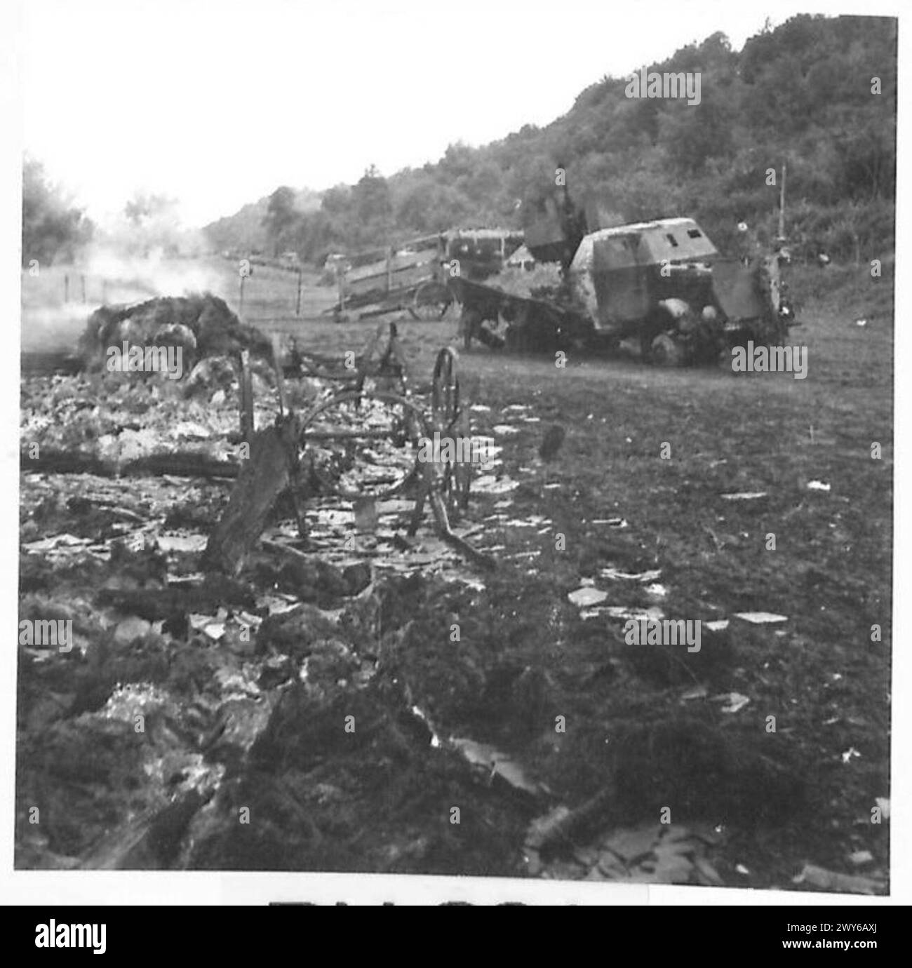 THE BIG ADVANCE - Armour passing a knocked out German S.P.gun. , British Army, 21st Army Group ...