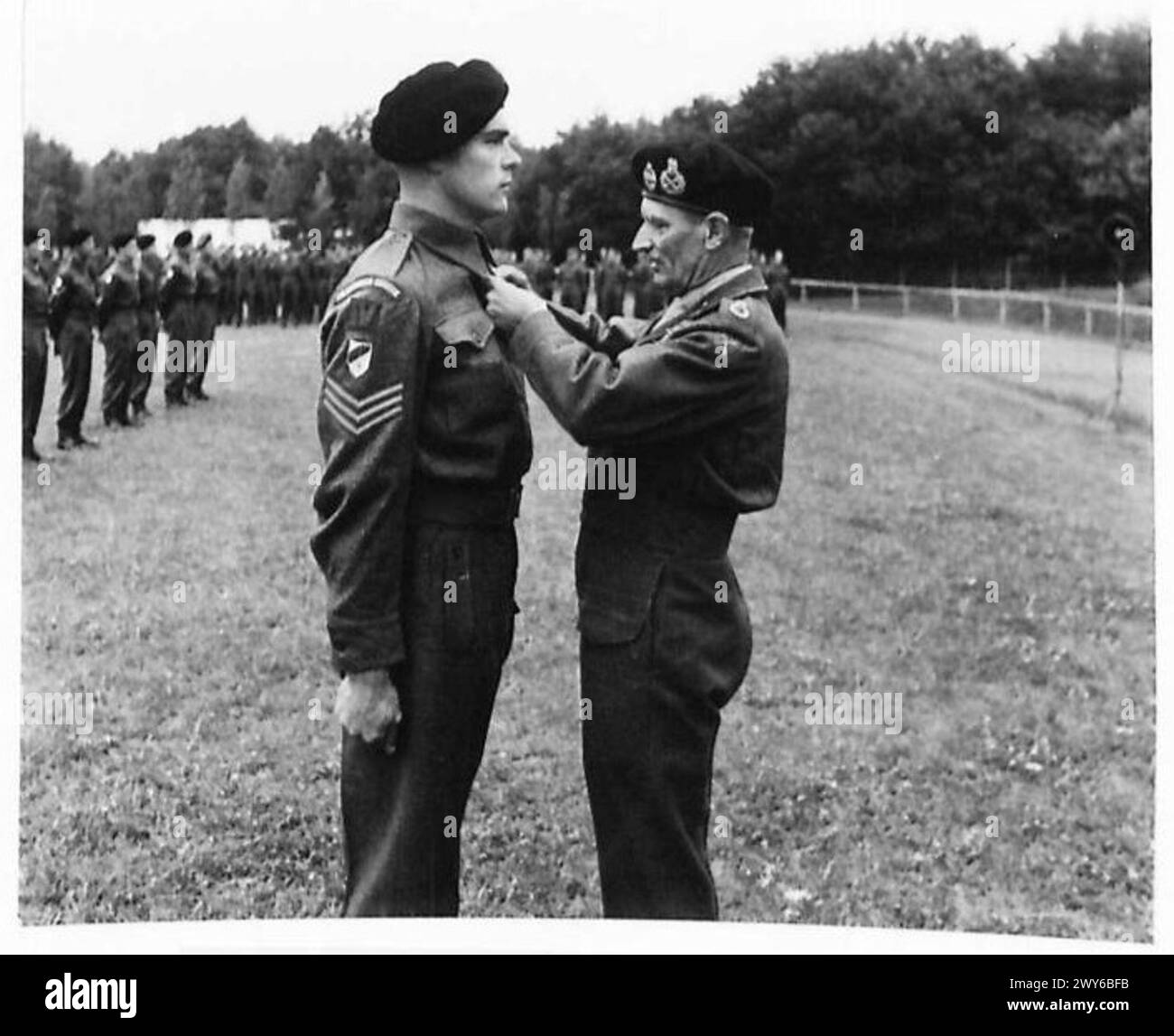 INVESTITURE CEREMONY FOR MEN OF THE 6TH GUARDS ARMOURED BRIGADE - L/Sgt ...