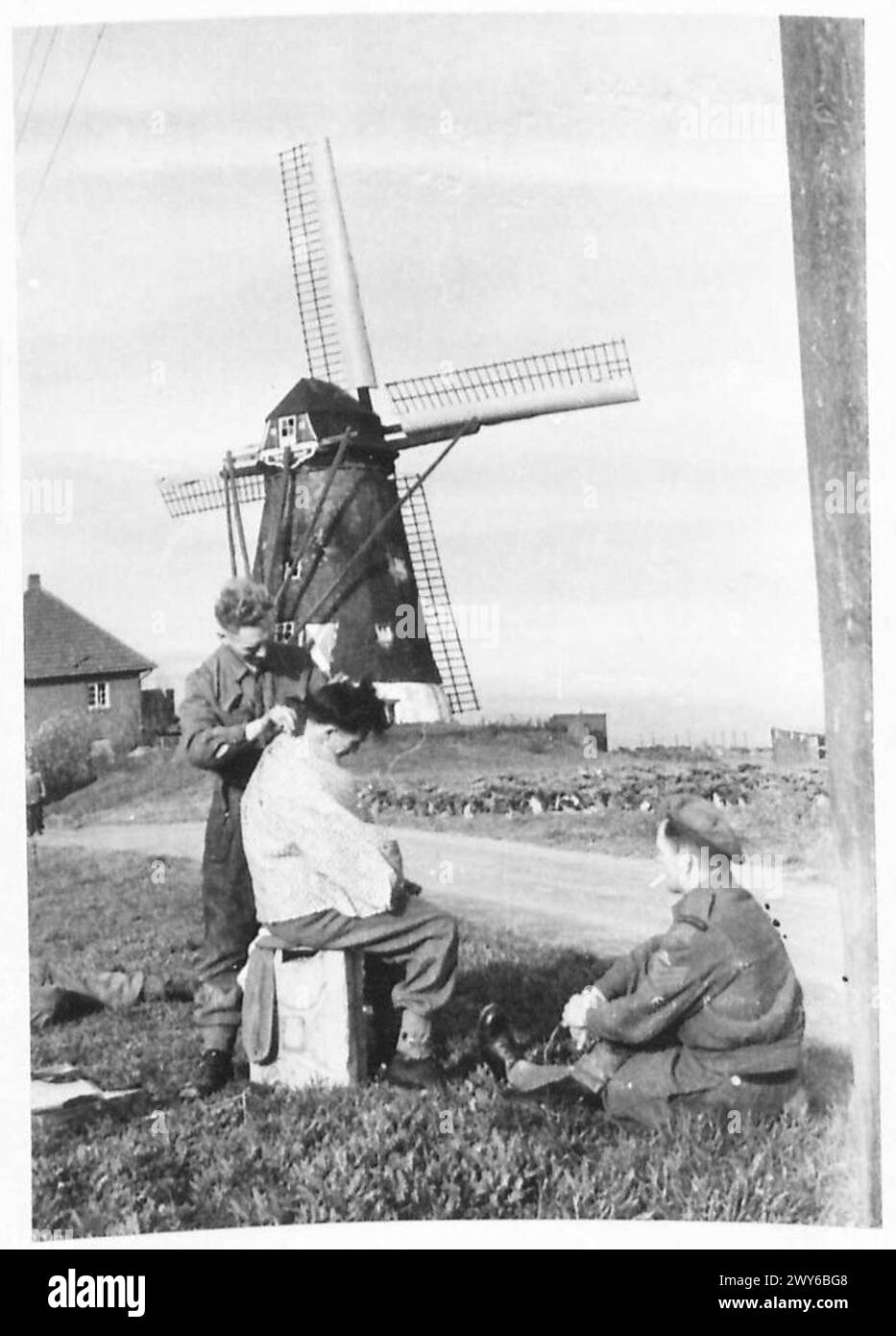 WAR IN HOLLAND - British soldiers giving each other a haircut. In the ... WAR IN HOLLAND - British soldiers giving each other a haircut. In the ...