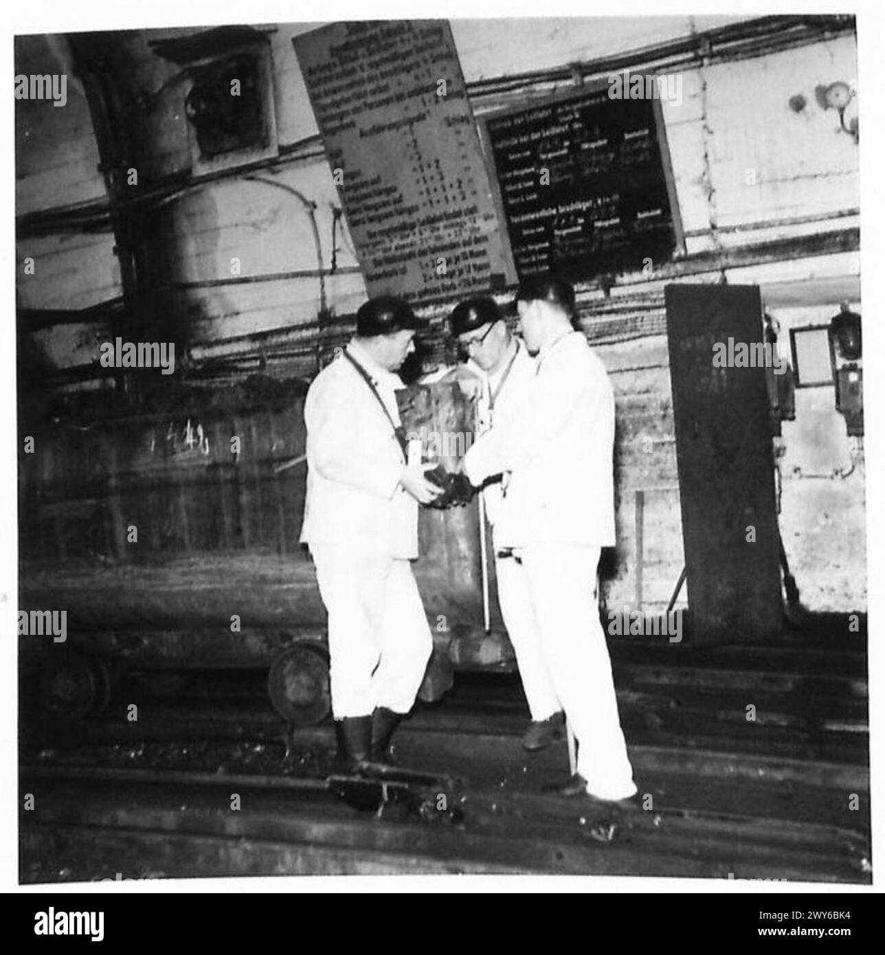 THE NORTH GERMAN COAL CONTROL - Coal control experts examine a train ...