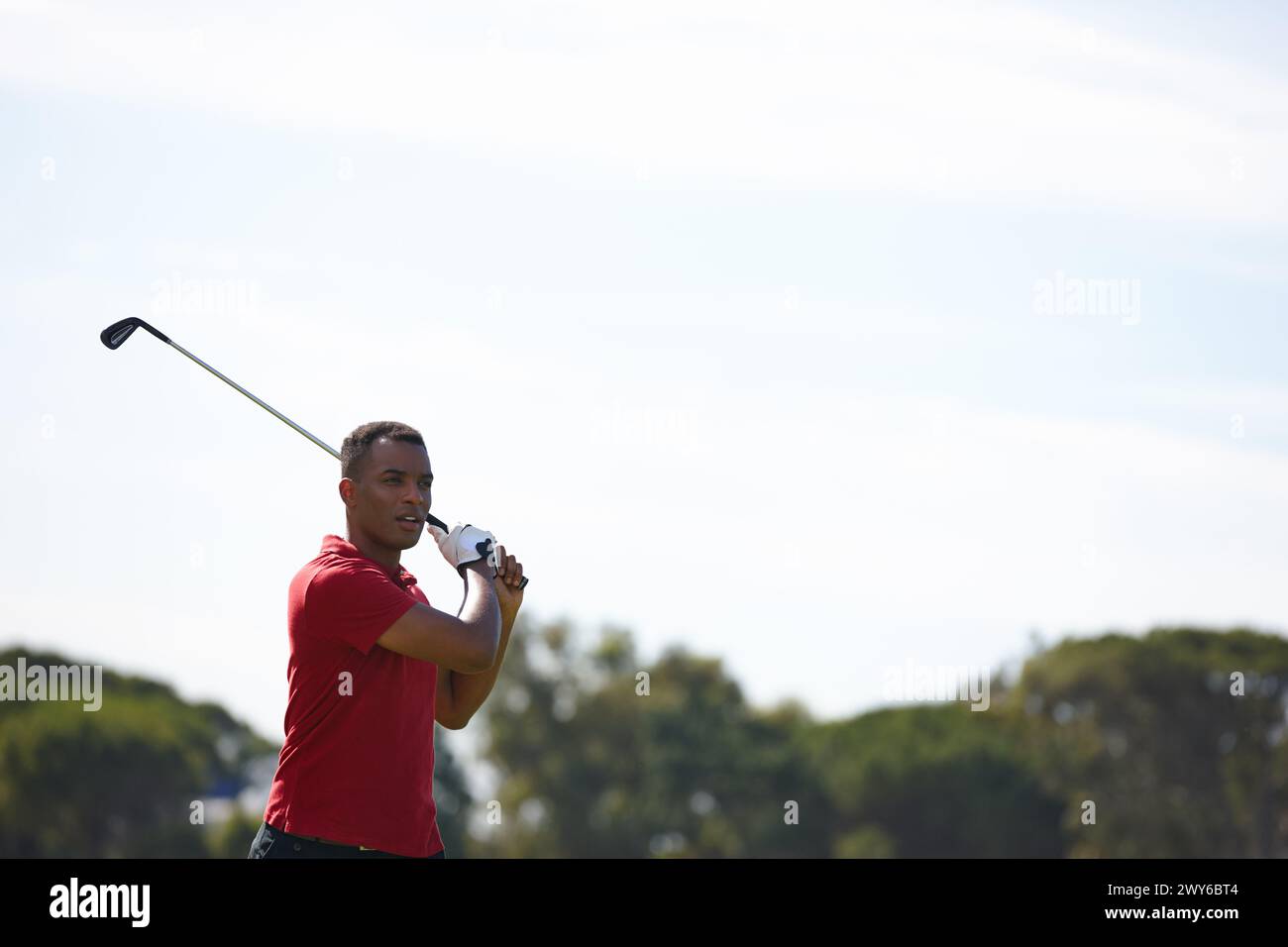 Man, golf course and swing with club for point, score or par in outdoor ...