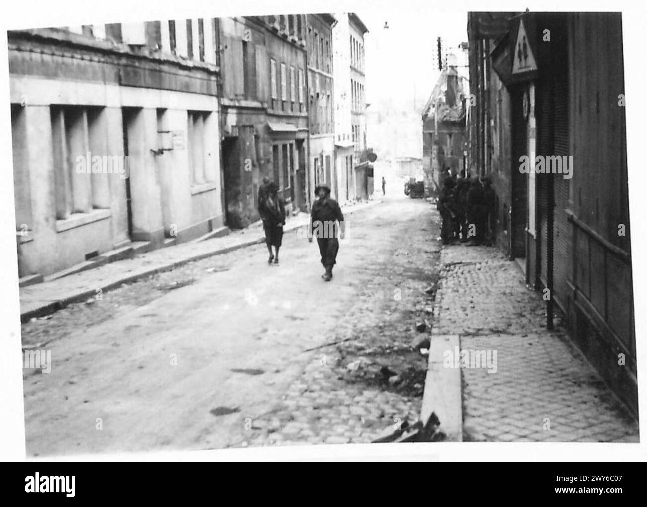 After British forces enter Caen, a main street shows post-liberation ...