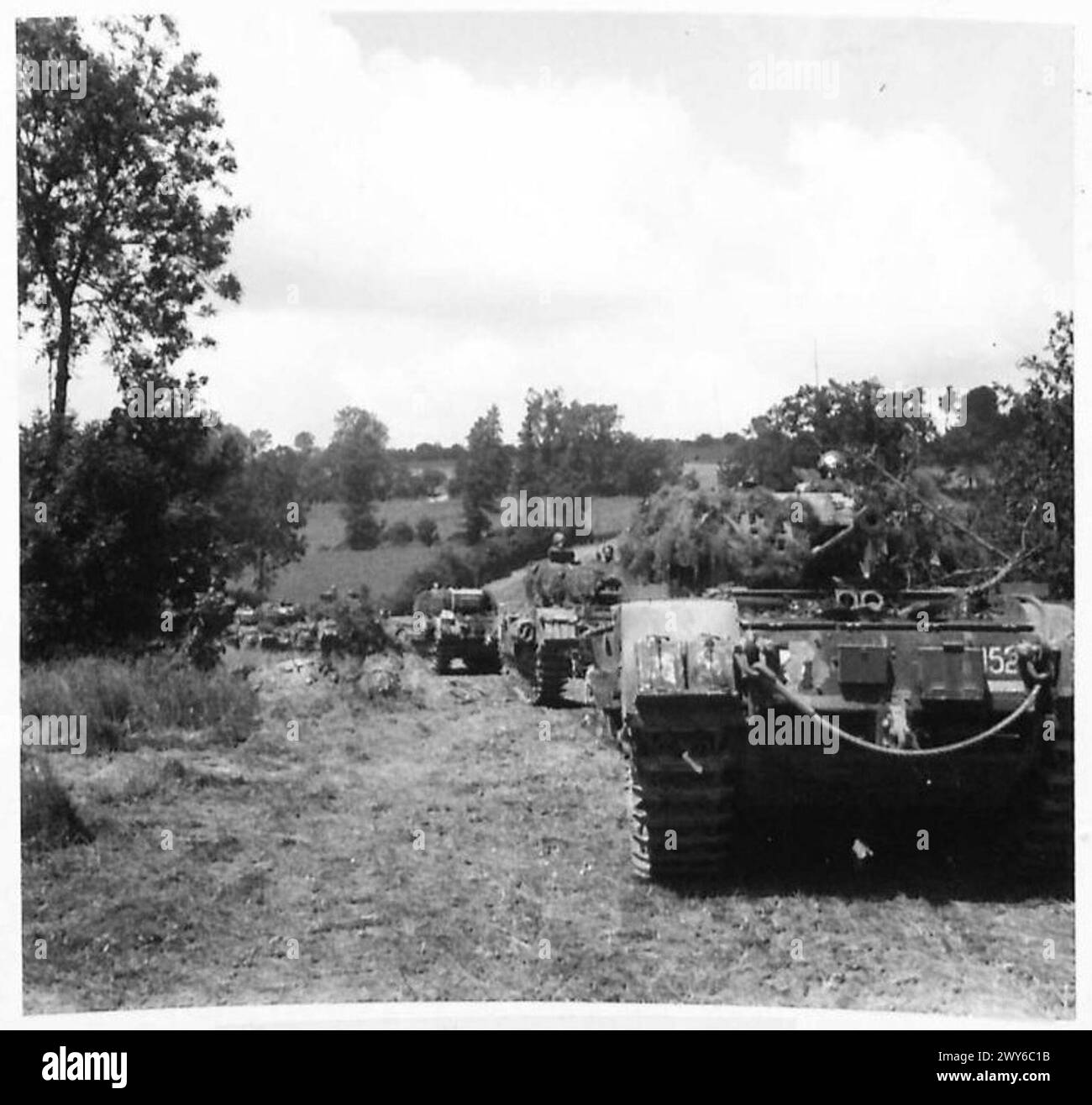 Tanks of the Guards Armoured Brigade advance from Caumont during a new ...