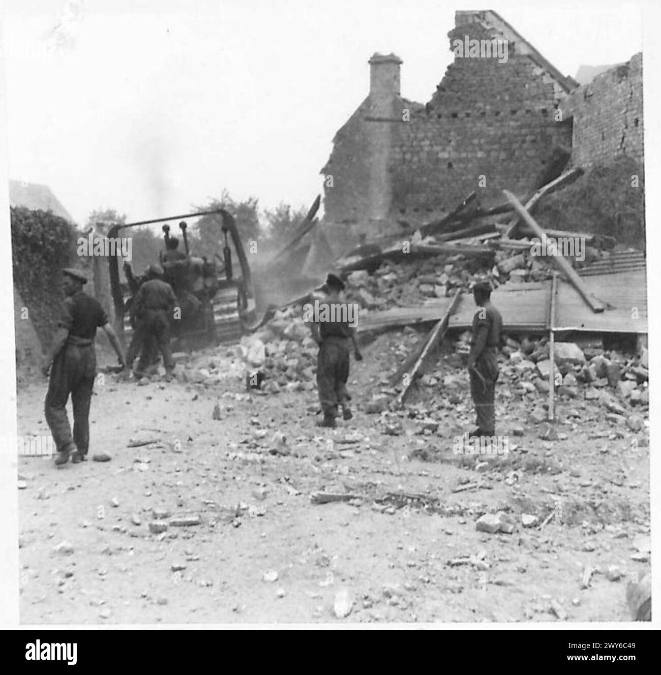 CLEARING A DEVASTATED FRENCH VILLAGE - Bulldozer and mechanical ...