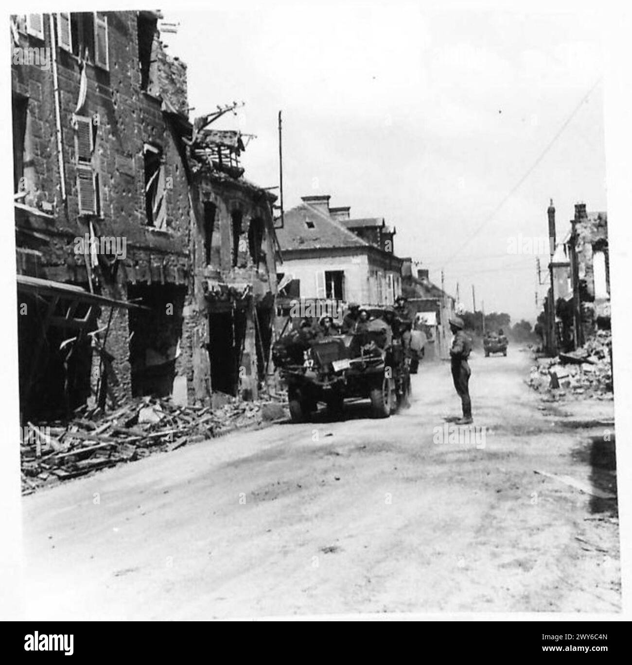 THE ATTACK SOUTH OF CAEN - Armoured and supply vehicles rushing up ...