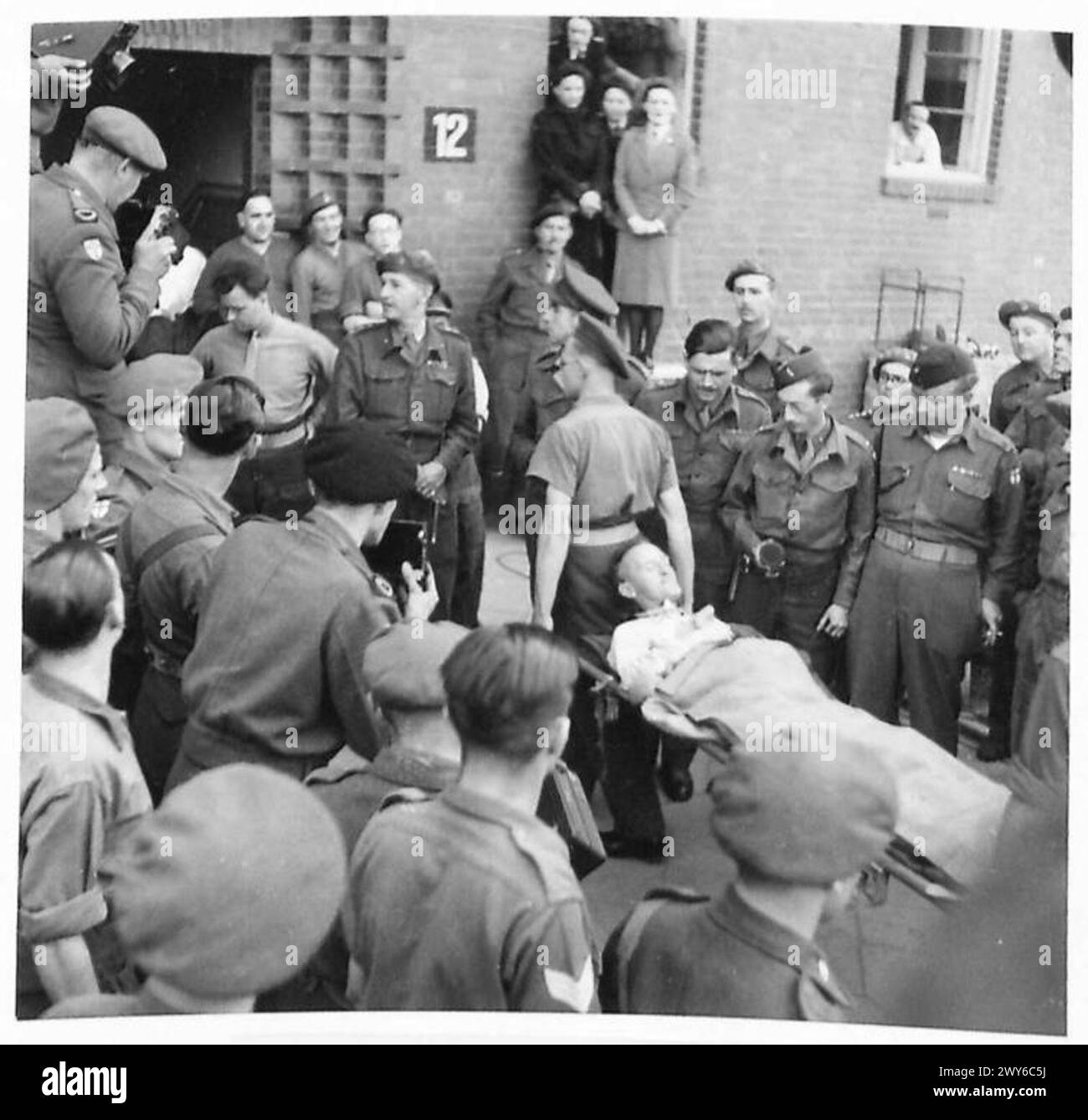 WILLIAM JOYCE AND WIFE AT 2ND ARMY - William Joyce being lifted from ...