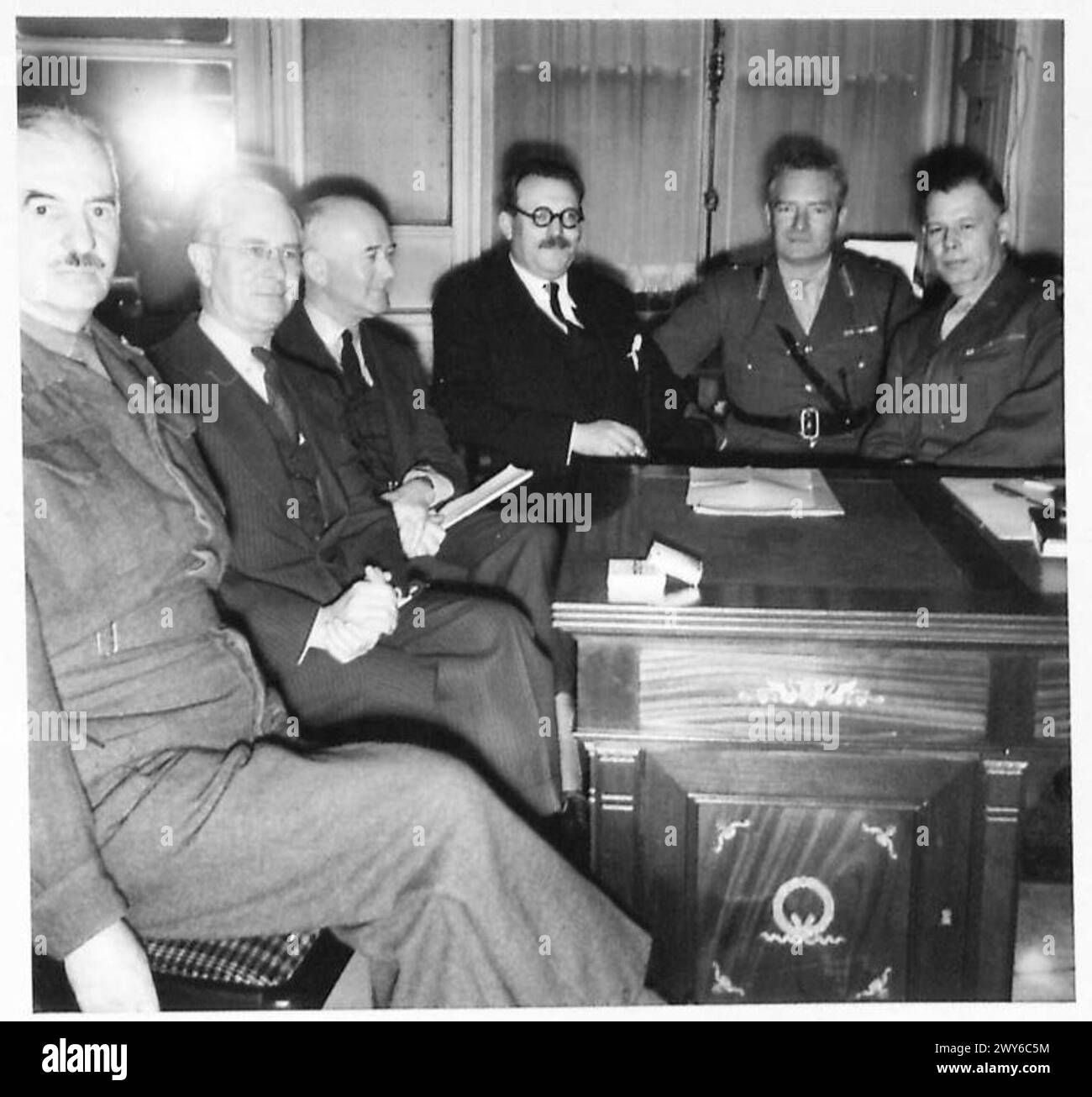 SHAEF VISIT TO BELGIAN PREMIER - Round the Conference Tables, Left to ...