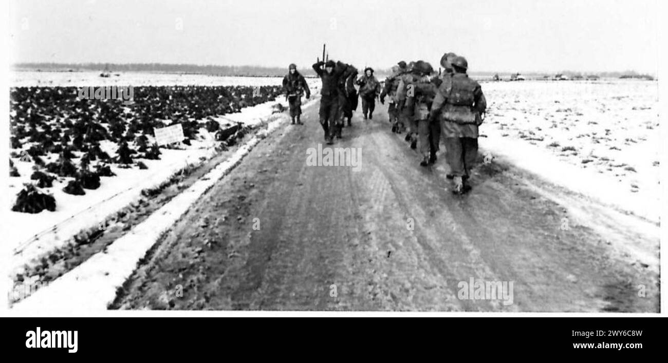 12 CORPS ADVANCE - As the troops advance, German prisoners are brought ...
