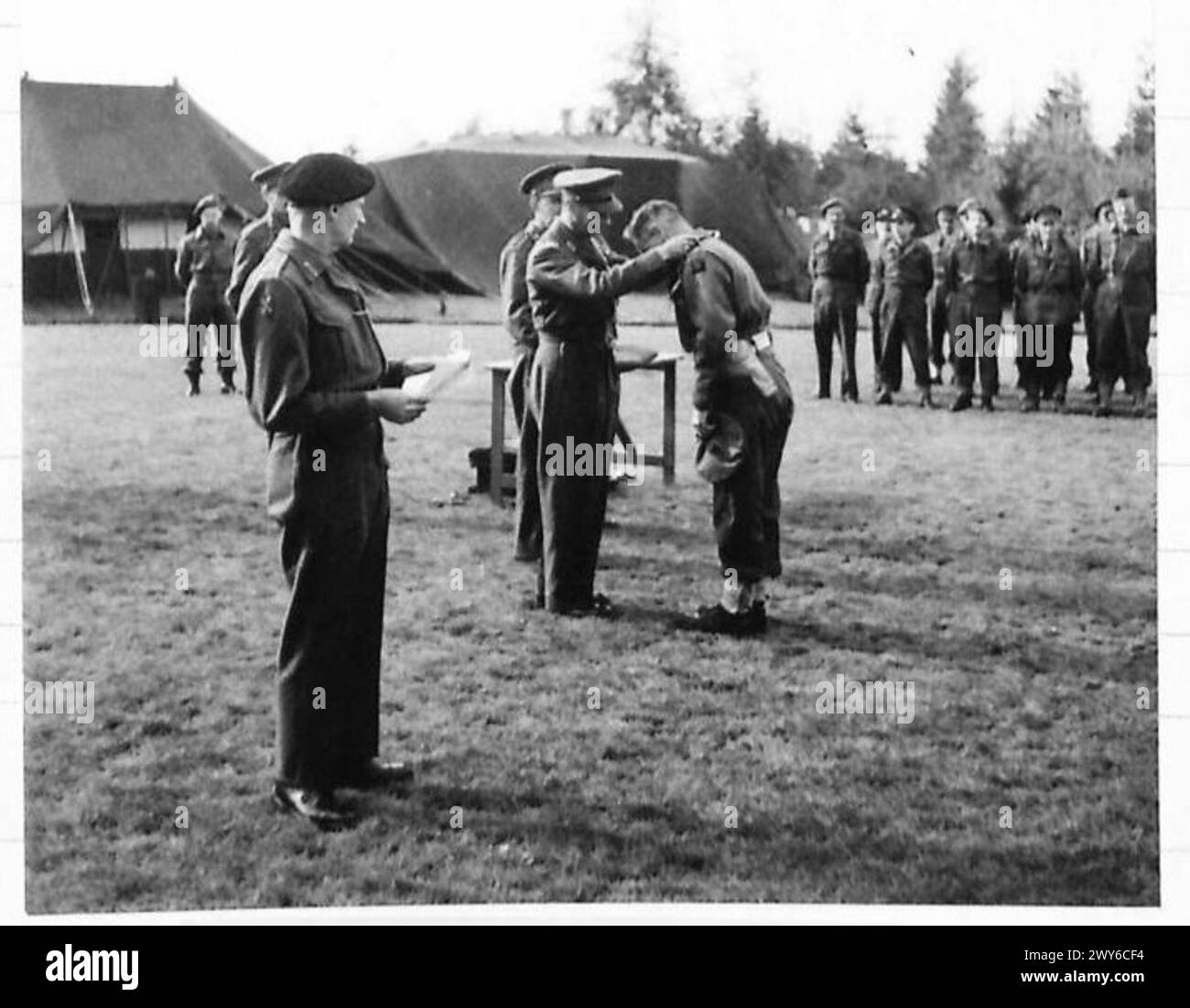 AN INVESTITURE IN THE FIELD. - Major Gen. D.A.H. Graham, receives the C ...