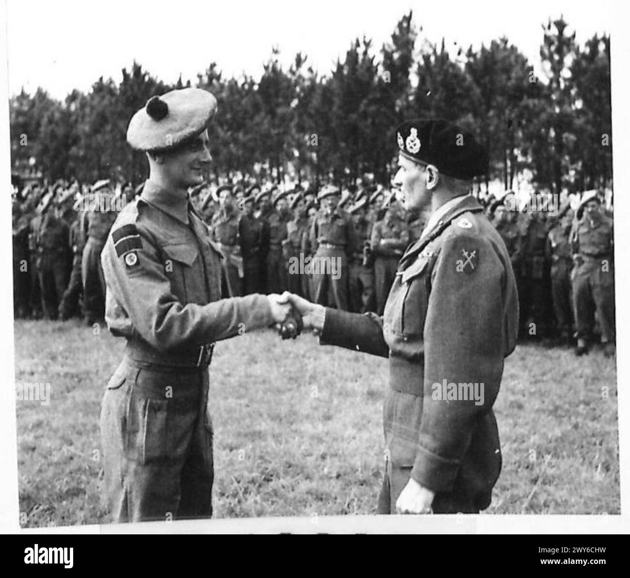 Pte. J.F. Murray of the 7th Seaforths receives the Military Medal from ...