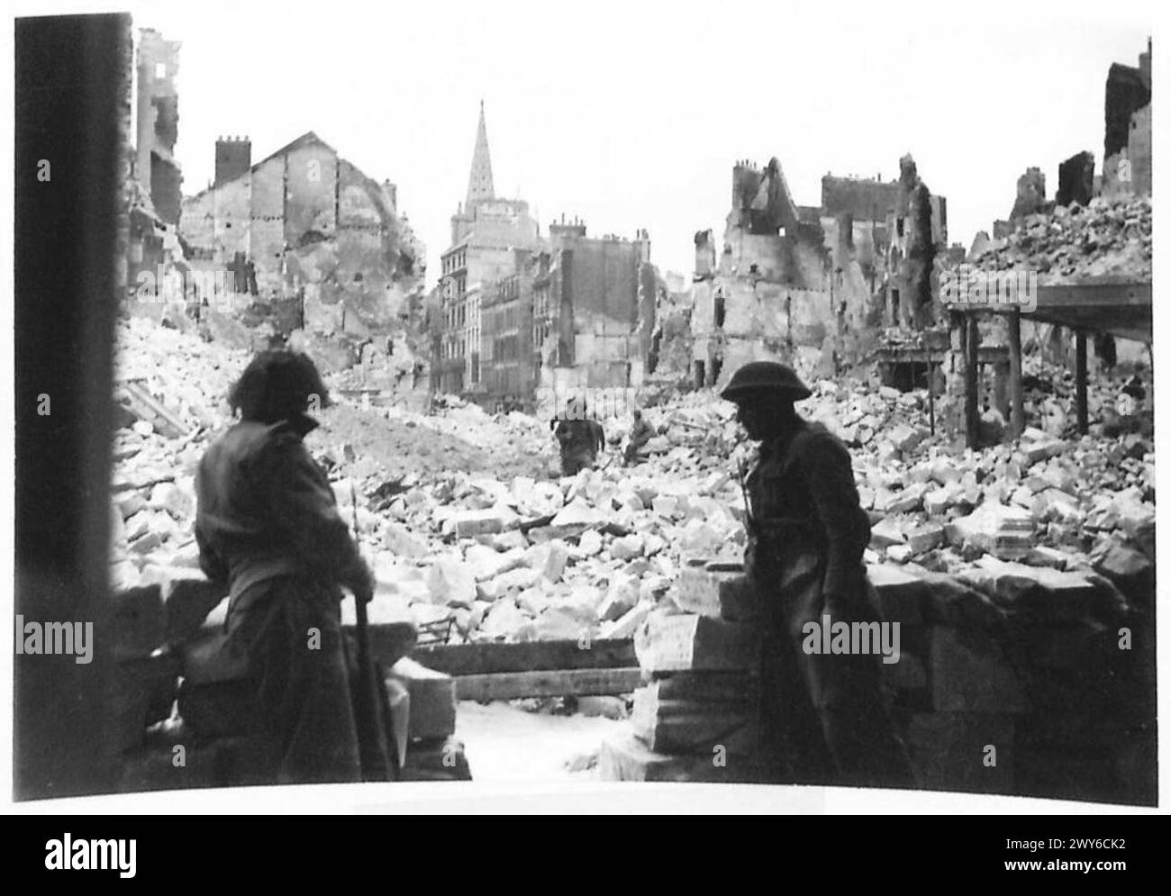 CAPTURE OF CAEN - Troops keeping a sharp look-out among the ruins of ...