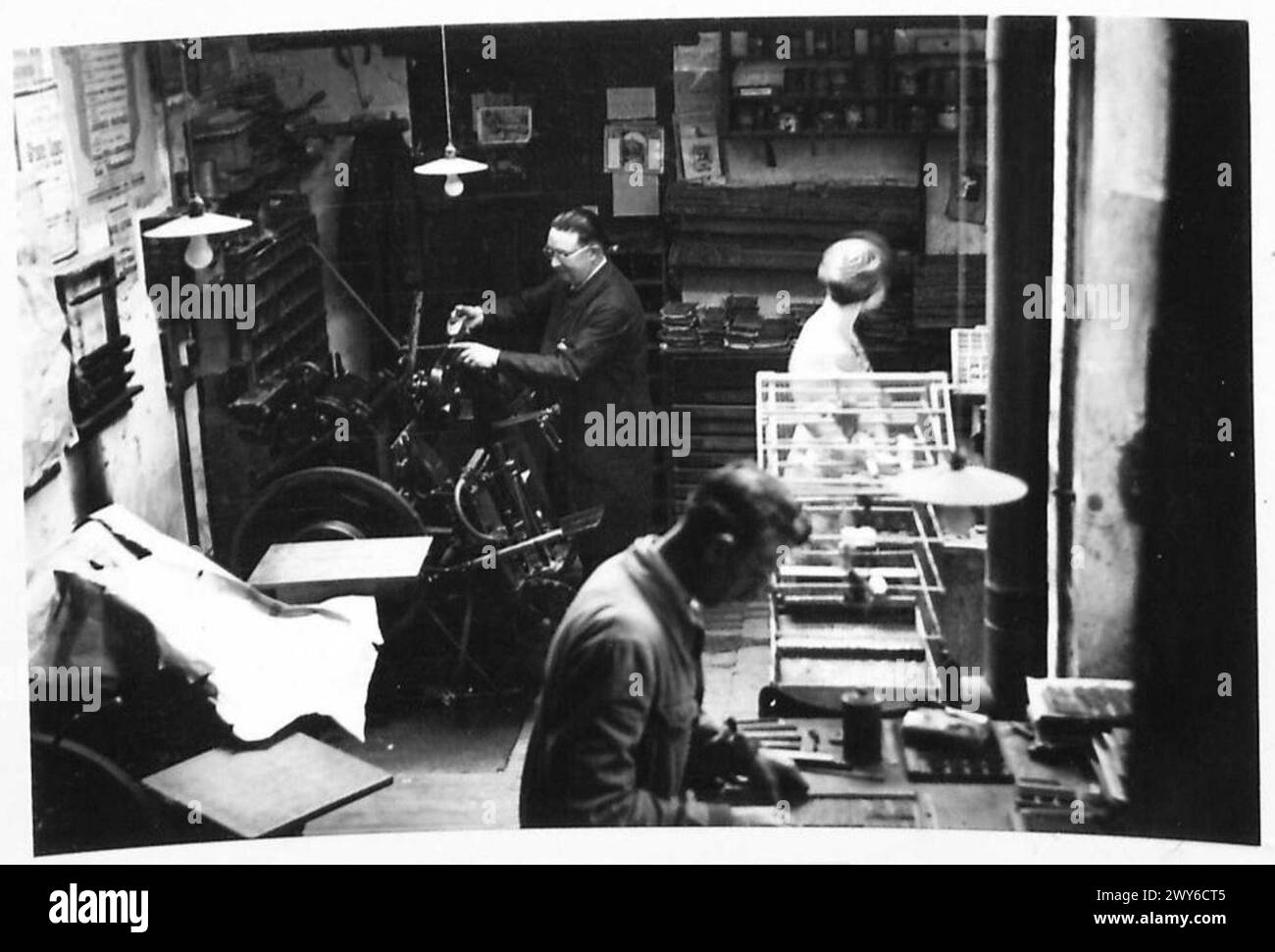 Copies of the daily newspaper 'La Voix des Allies' are prepared in M ...