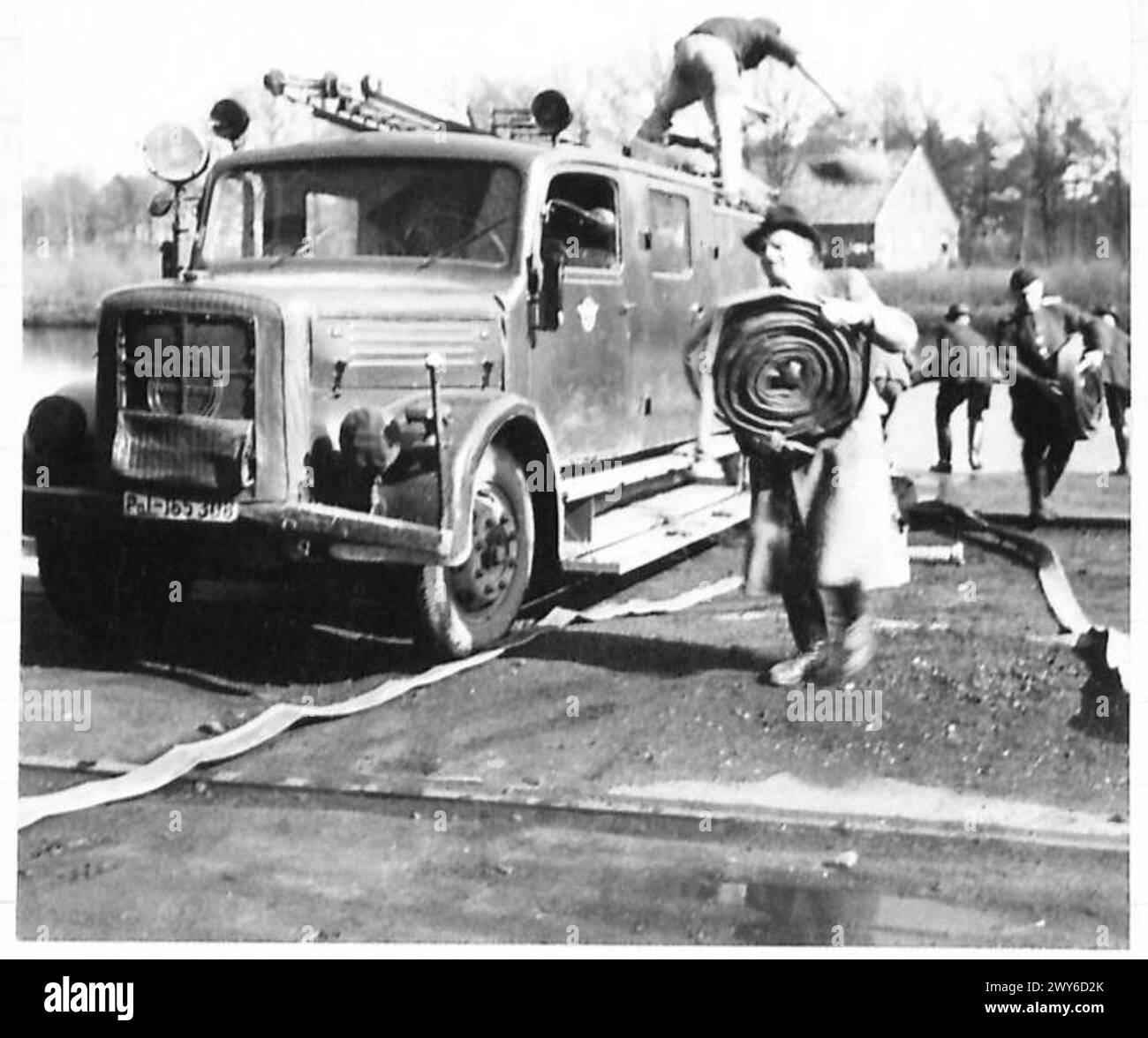 GERMANS CIVILIANS FIGHT COAL DUMP FIRE - German civilians running out ...