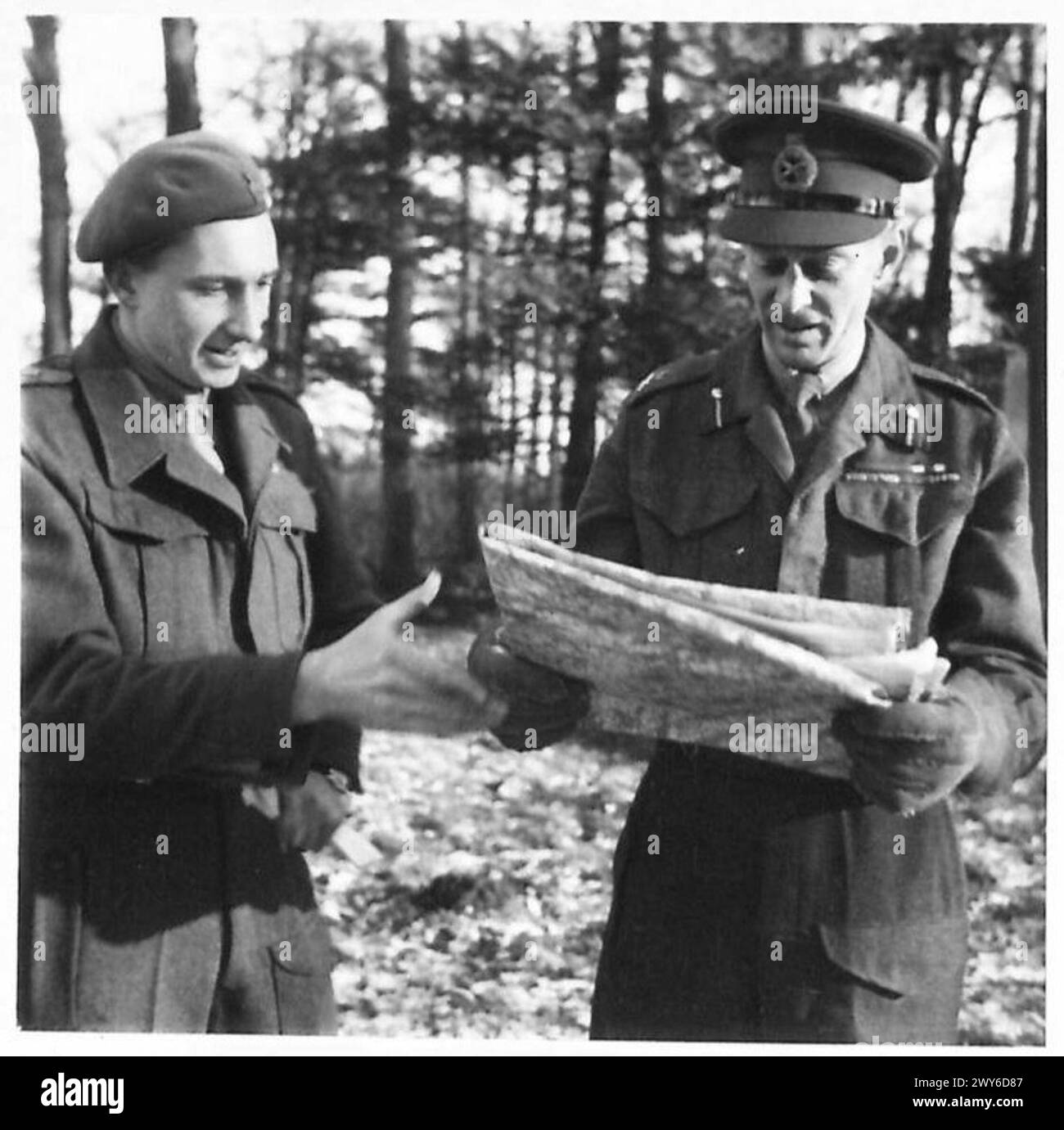 LT-GEN SIR CM DEMPSEY, KCB DSO MC - Lt-Gen Dempsey looking at the map ...