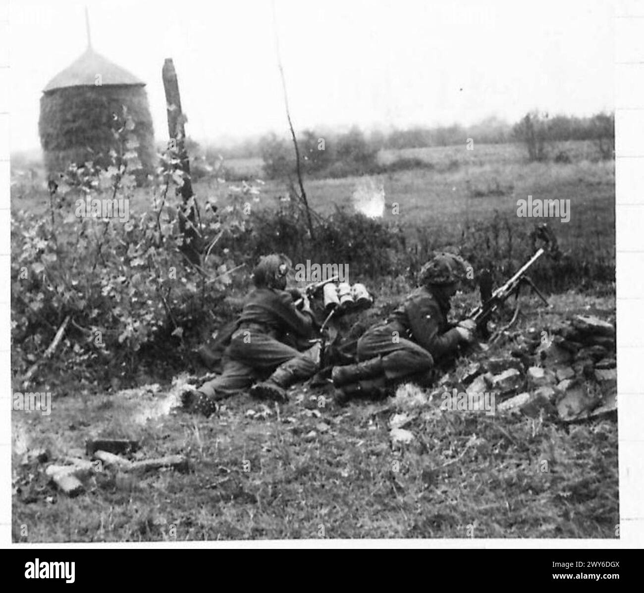 SAME STORY. - Infantry section take cover in a shallow Hole. , British ...