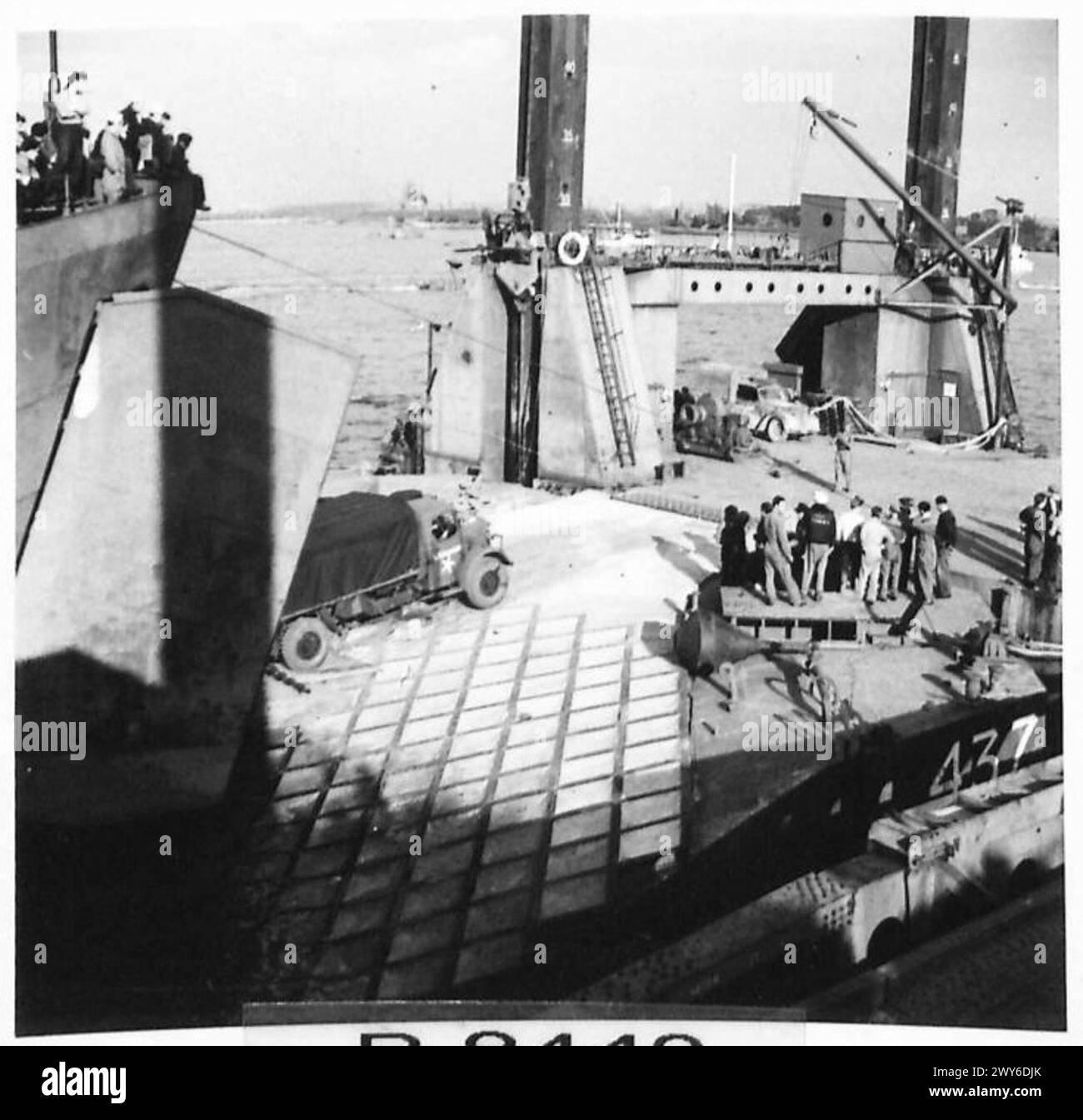 PHOTOGRAPHS OF PREFABRICATED PORT ETC - MT Vehicle passing from LST to ...