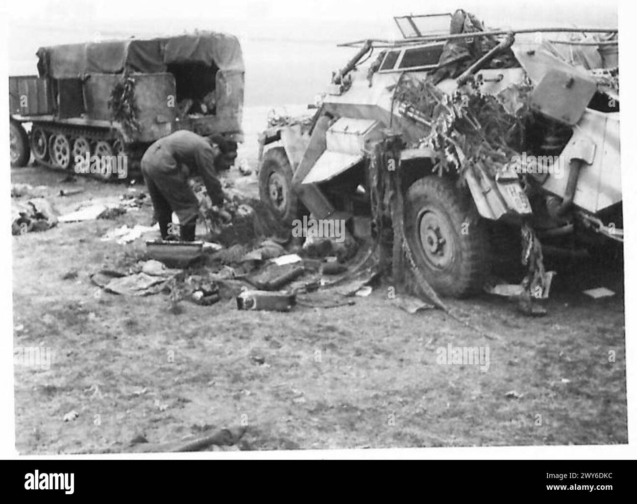 WRECKED GERMAN VEHICLES ETC. - A large number of armoured cars, half ...