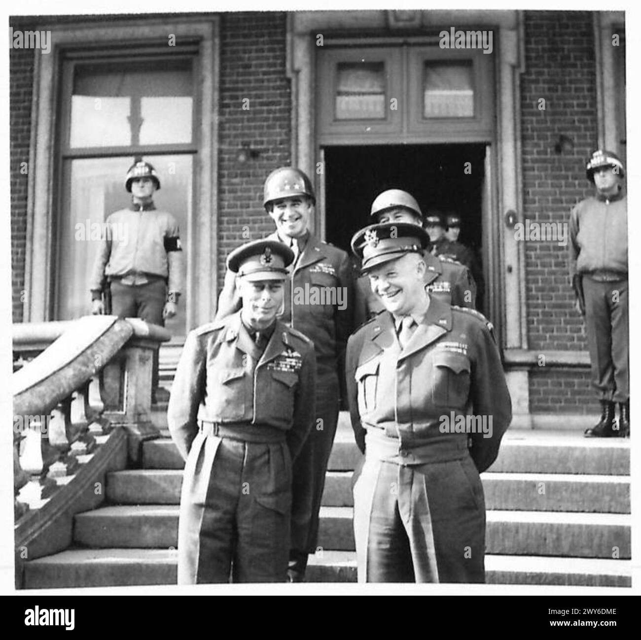 H.M. THE KING VISITS AMERICAN 1st ARMY - H.M. the King chatting with ...