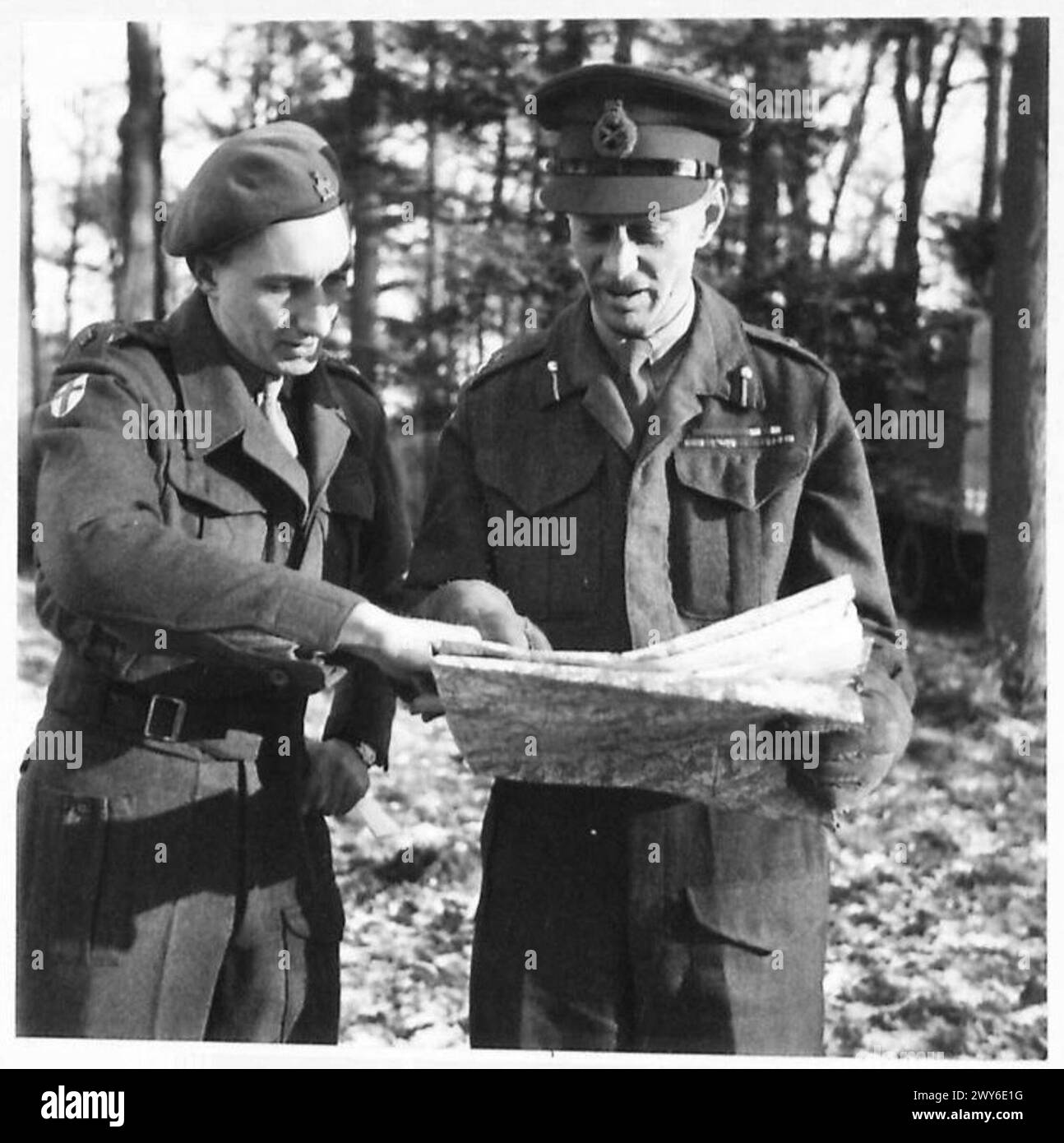 LT-GEN SIR CM DEMPSEY, KCB DSO MC - Lt-Gen Dempsey looking at the map ...
