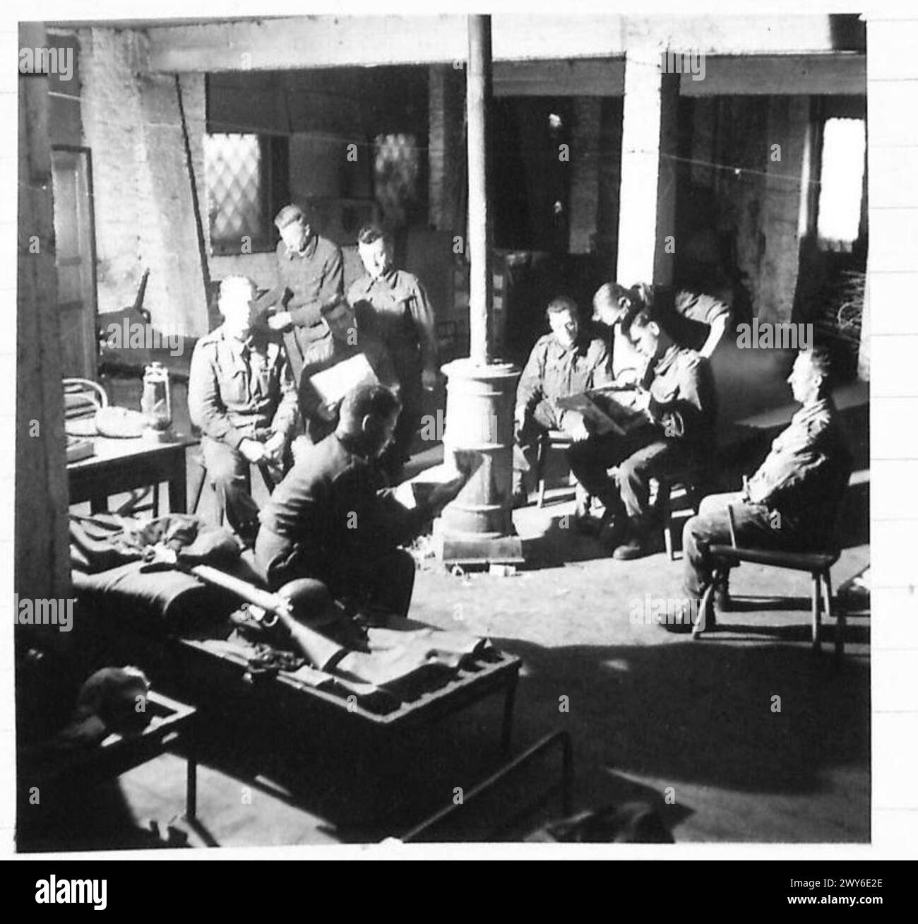 RUINED ENEMY BARRACKS USED BY BRITISH TROOPS. - An interior view of the ...