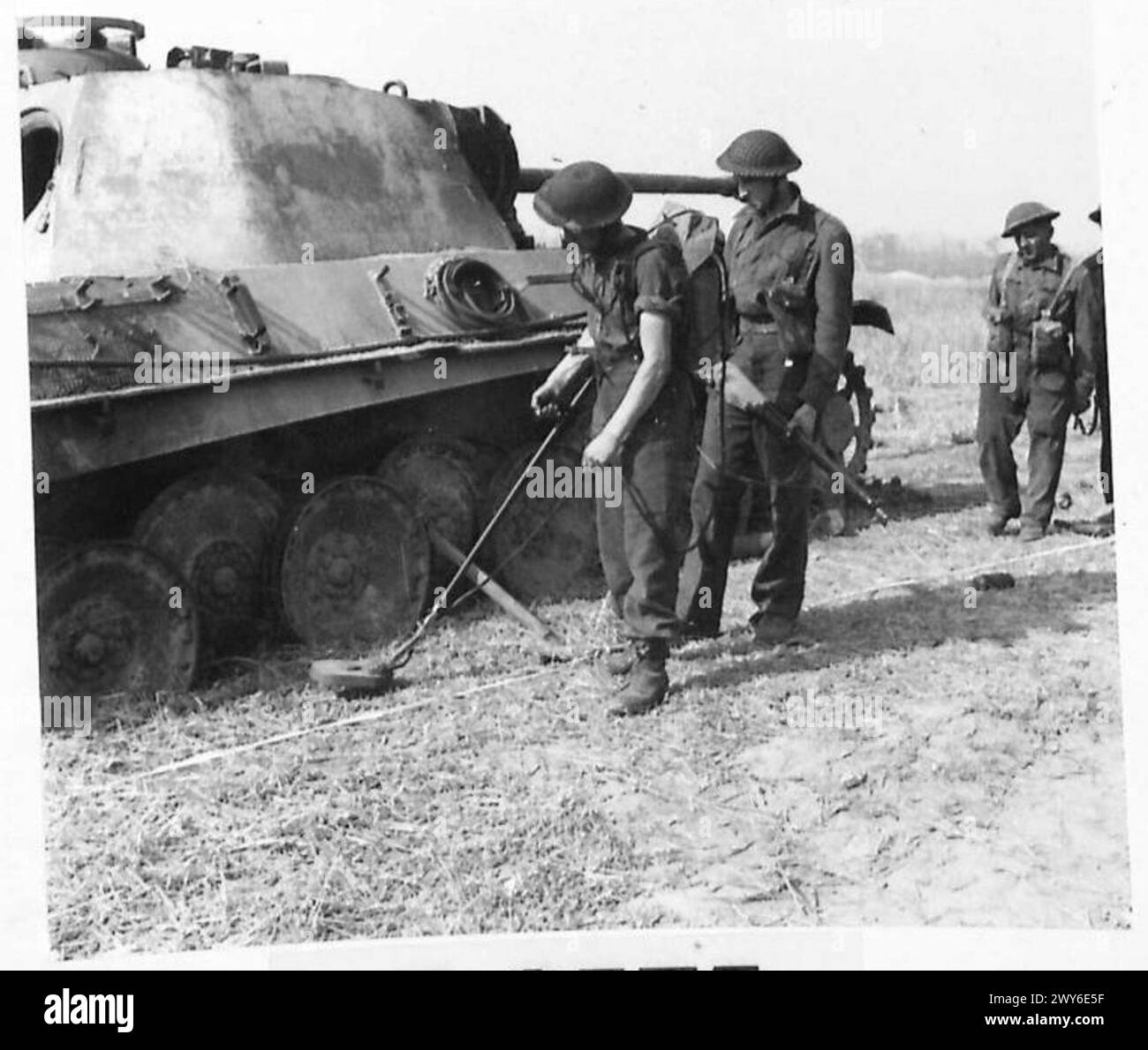 Royal Engineers of the British Army sweep a field for mines near ...