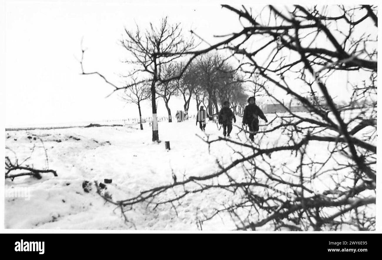 BRITISH ATTACK NEAR HEINSBERG - Tanks and infantry moving up towards ...