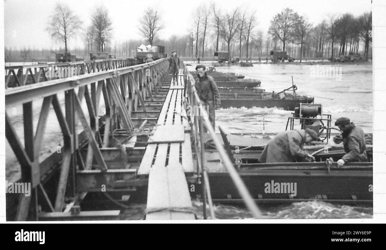 THE MAAS IN FLOOD NEAR MAESEYK - General view of the surging river and ...