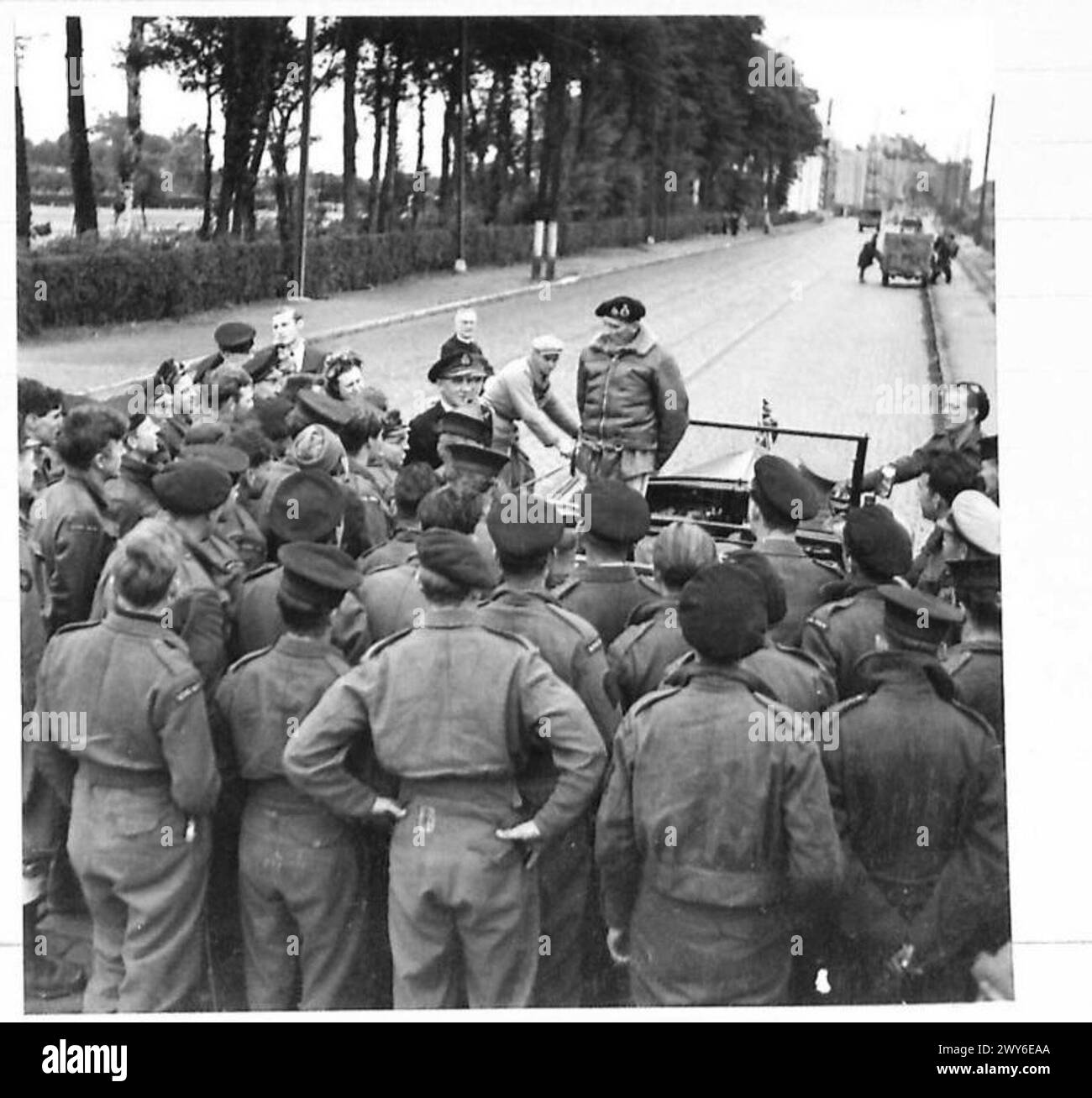 Field Marshal Montgomery speaks to a naval port party, including Prince ...