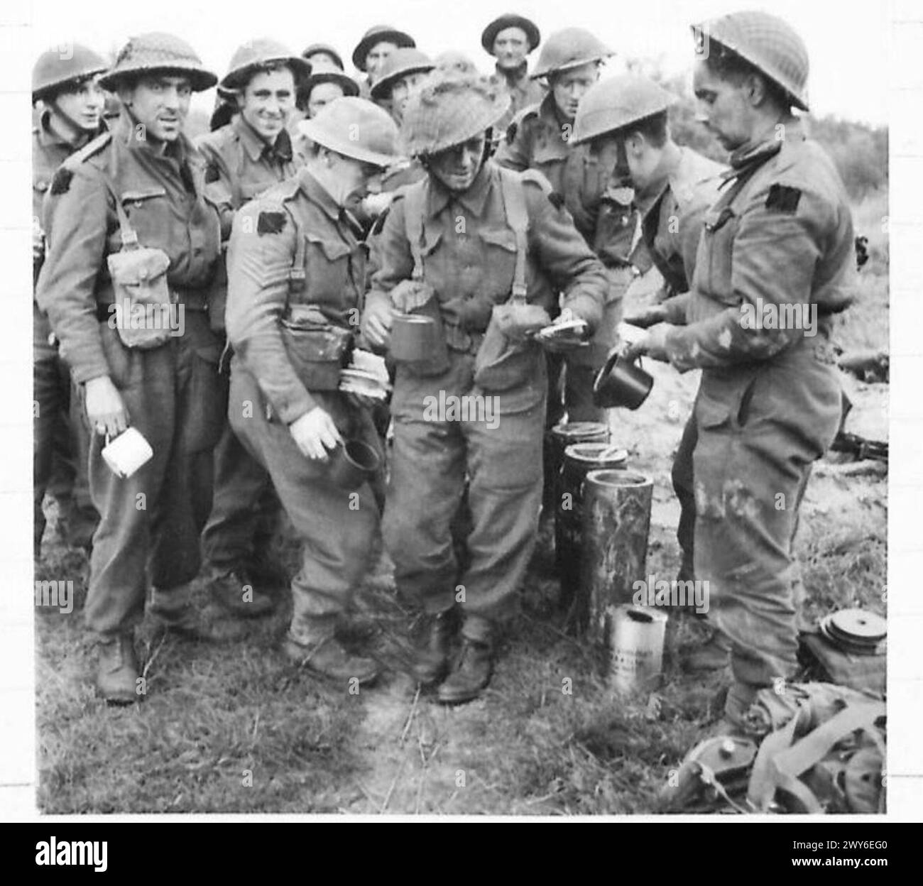 WITH THE ROYAL SCOTS AT MOOSTDIJK - The scene as men of "C" Coy line up ...
