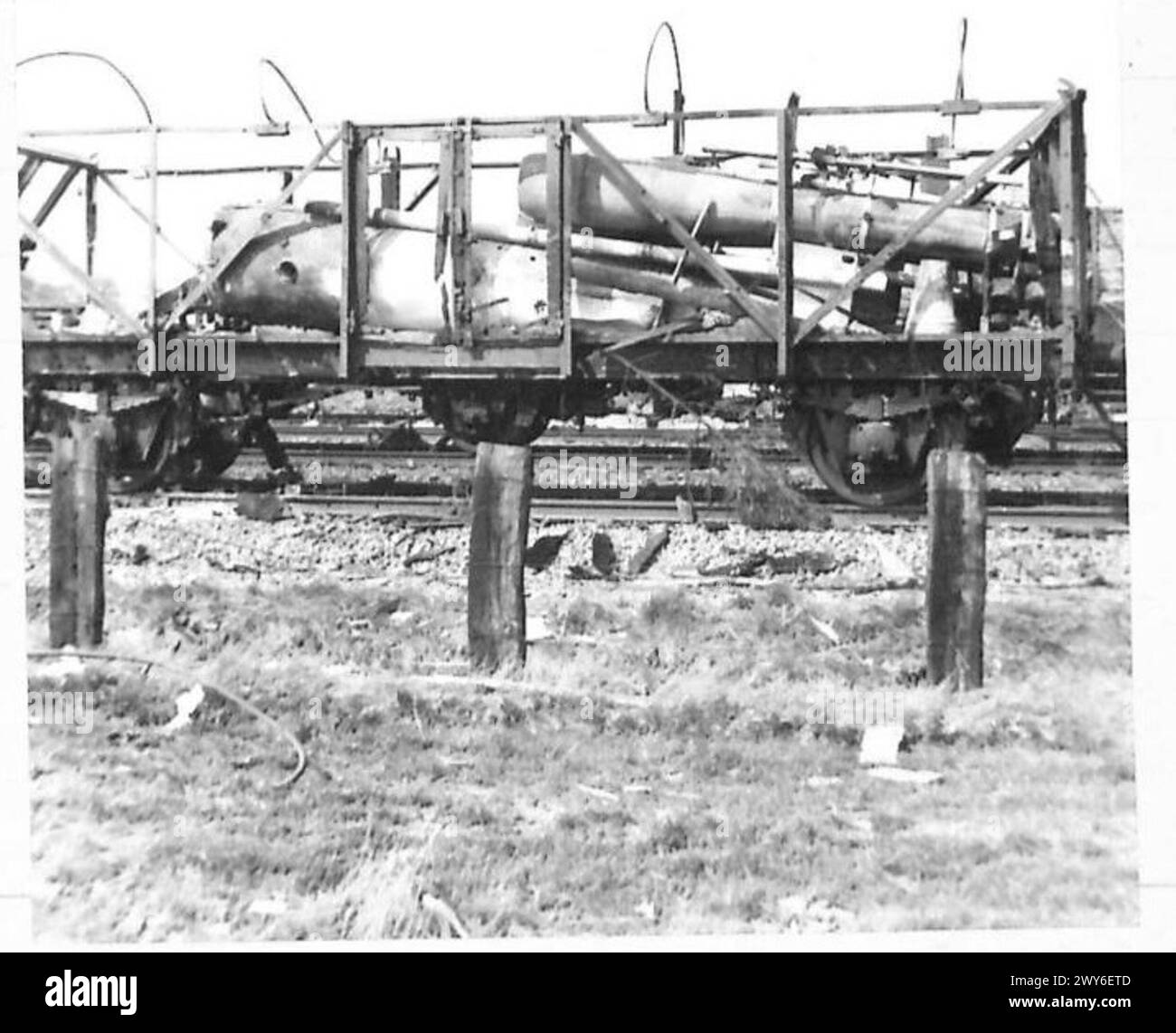 Wrecked V-weapons are transported in wagons by the British Army in ...
