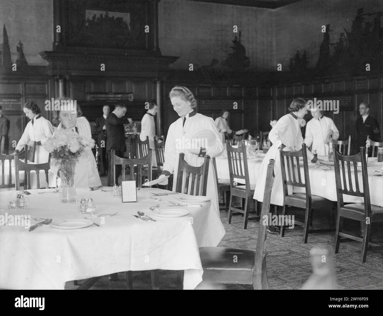 WRNS personnel perform duties in the Officers' Mess at a Royal Navy ...