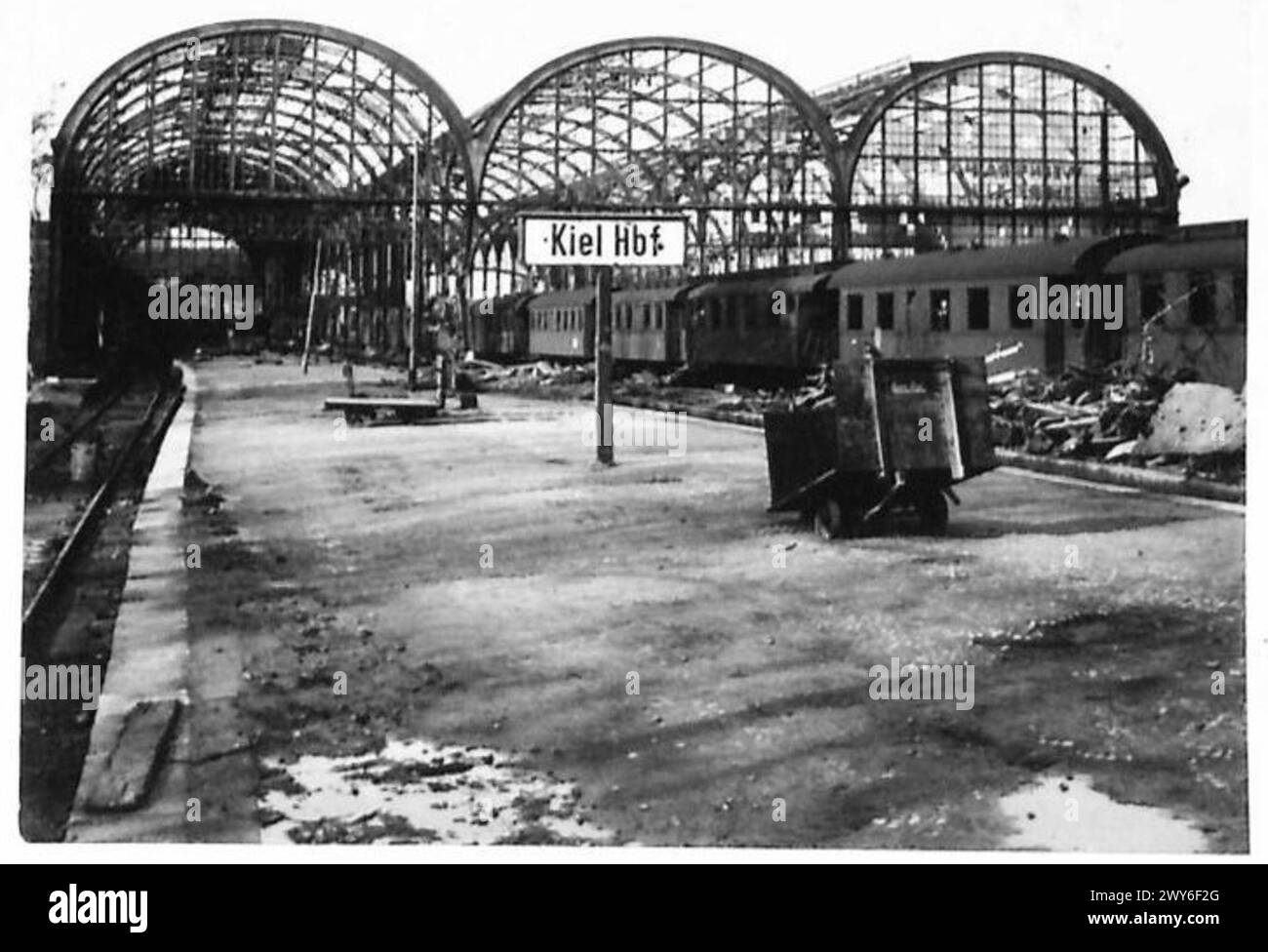DAMAGE IN KIEL - The badly damaged railway station in Kiel. , British ...