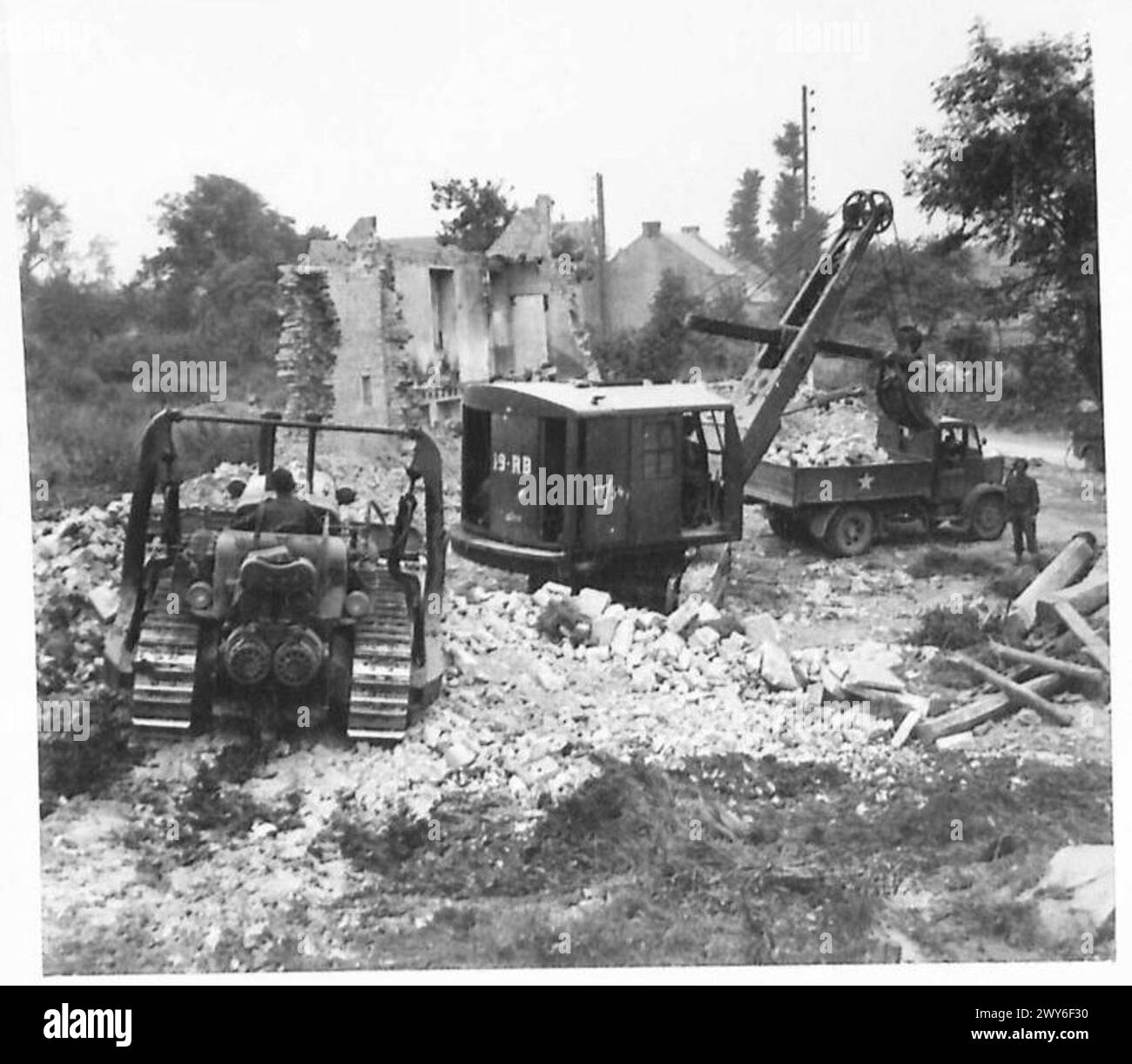 CLEARING A DEVASTATED FRENCH VILLAGE - Bulldozer and mechanical ...