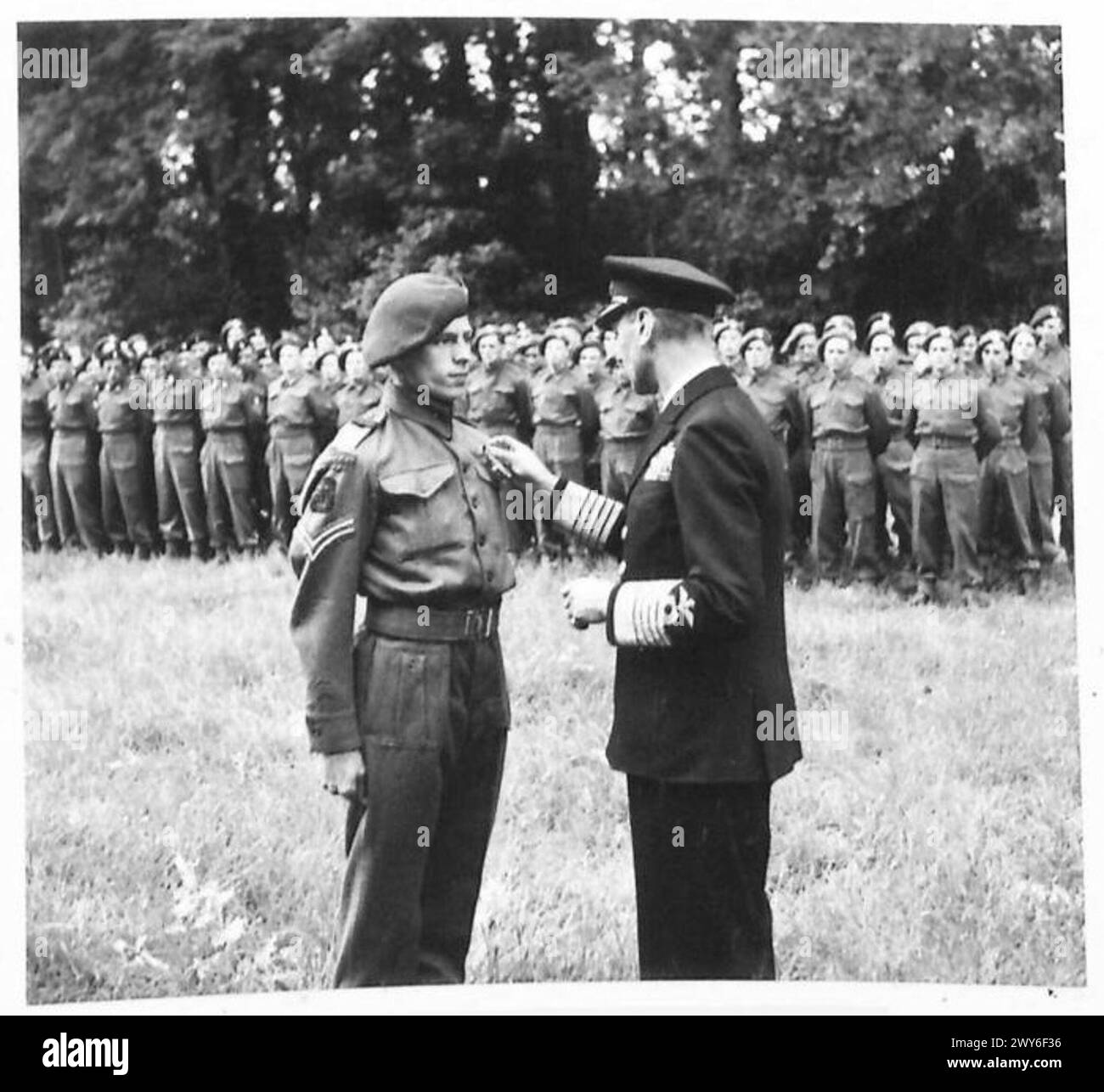INVESTITURE IN THE FIELD - Corporal J. W. Hadfield, Royal Marine ...